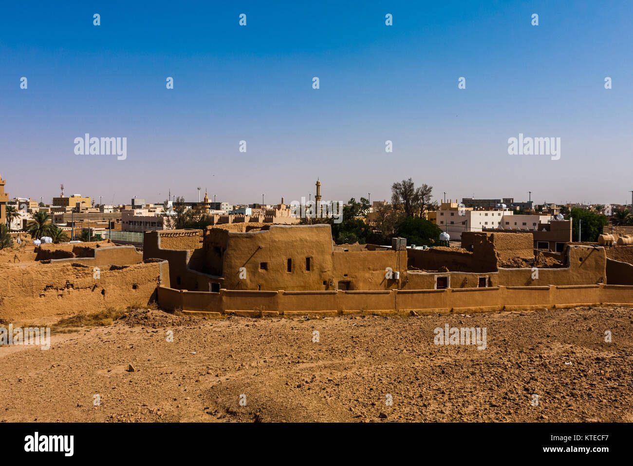 An aerial view of the mud brick suburbs from the Munikh Castle, Al ...