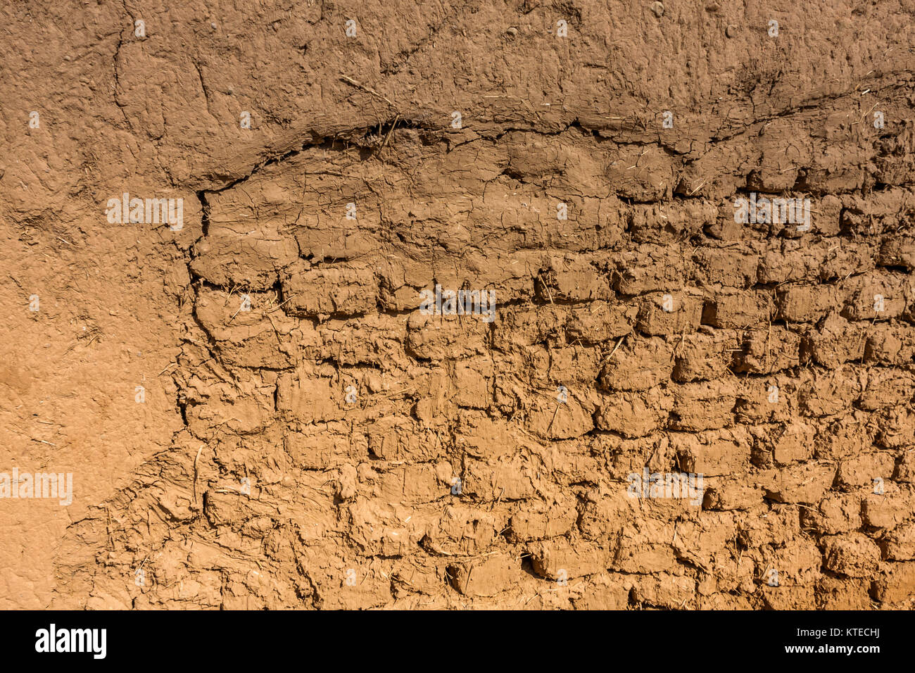A close-up view of the brickwork of a traditional Arab mud brick house ...