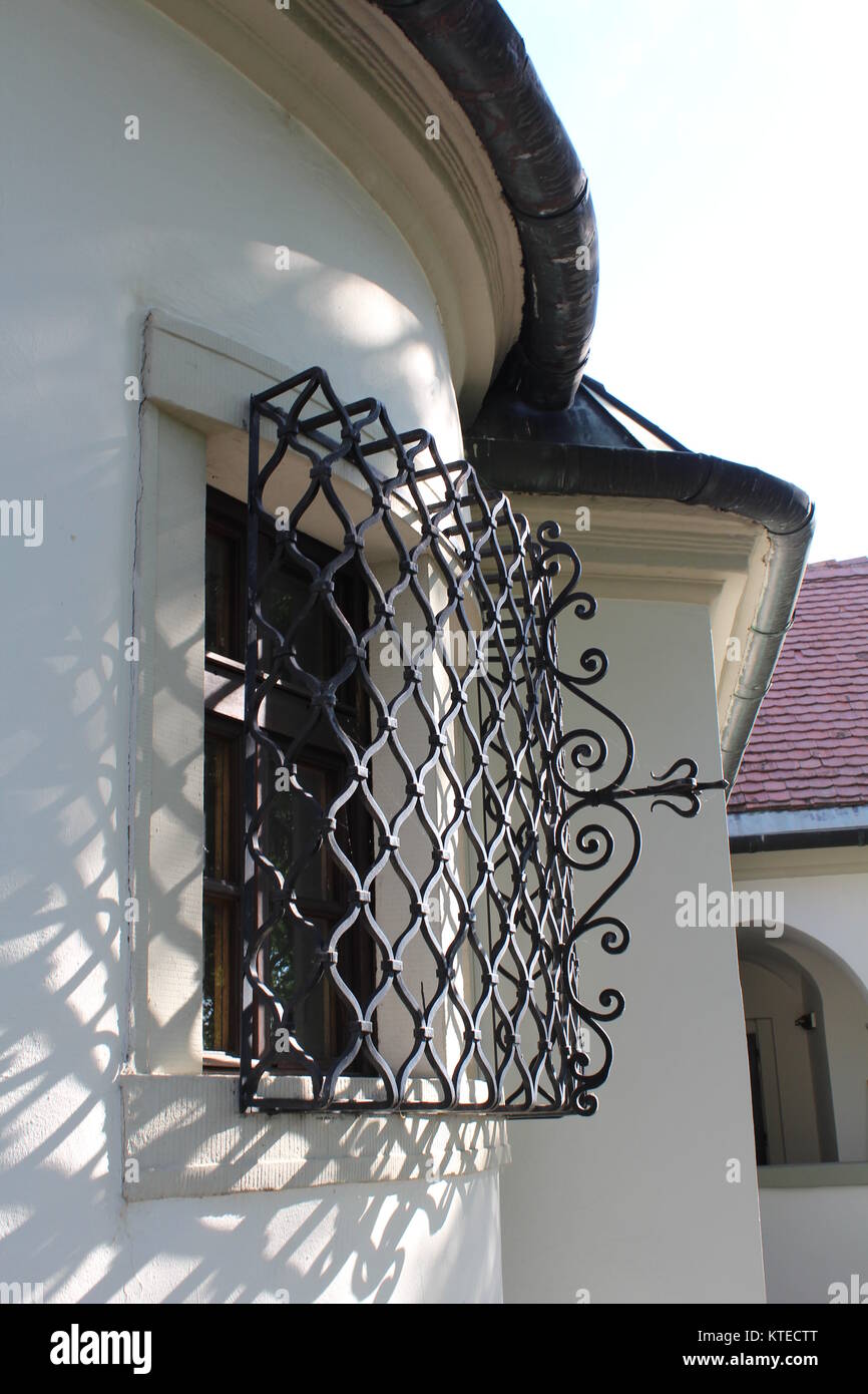 Architectural detail - decorative rail at window of a historical house ...