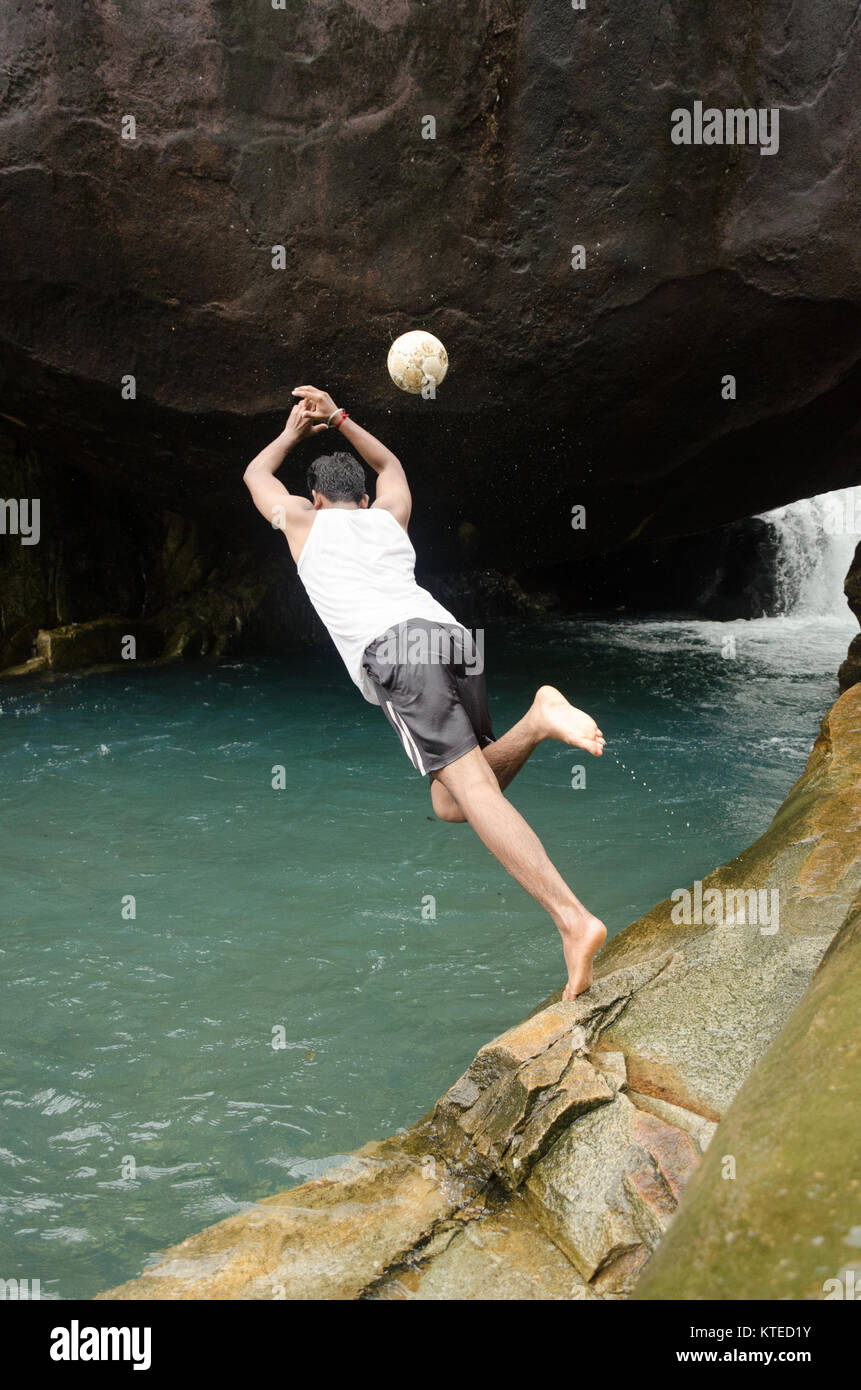 Jumping off cliff water hi-res stock photography and images - Alamy