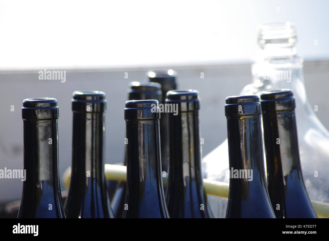 Empty wine bottles close-up isolated over white background Stock Photo ...