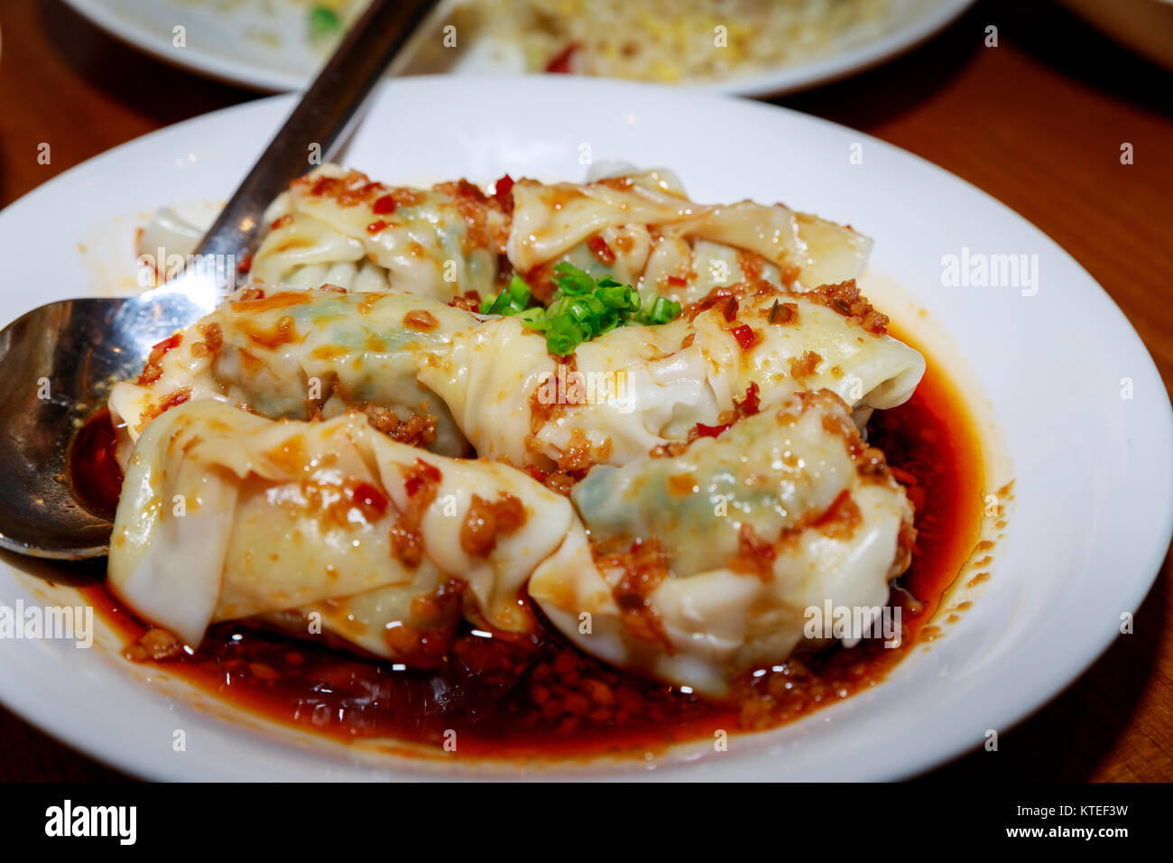 Asia chinese food - dim sum with red source Stock Photo - Alamy