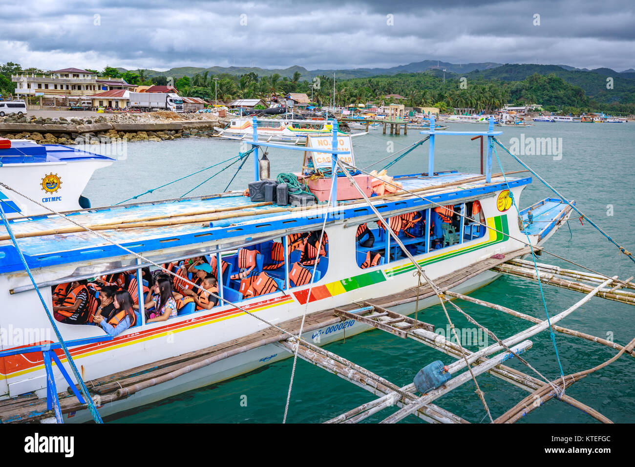 Traditional banca boat to get to Boracay Island at Caticlan jetty port ...