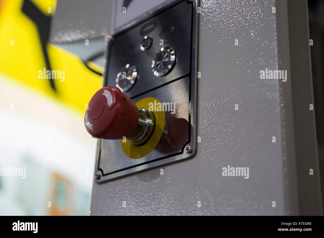 Emergency stop button of a machine Stock Photo - Alamy