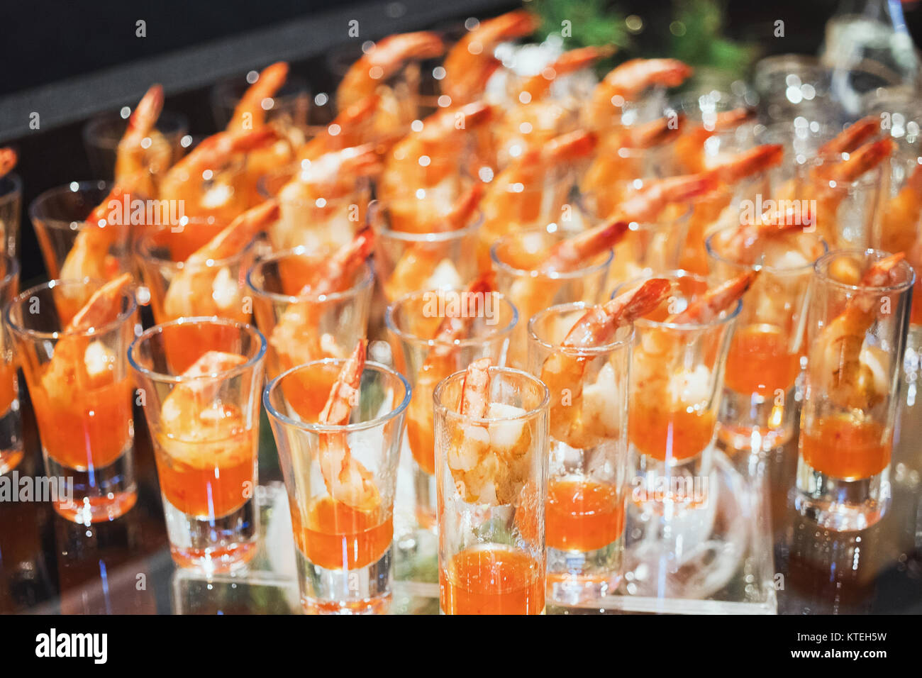 Shrimp cocktail in shot glass shot closeup Stock Photo - Alamy