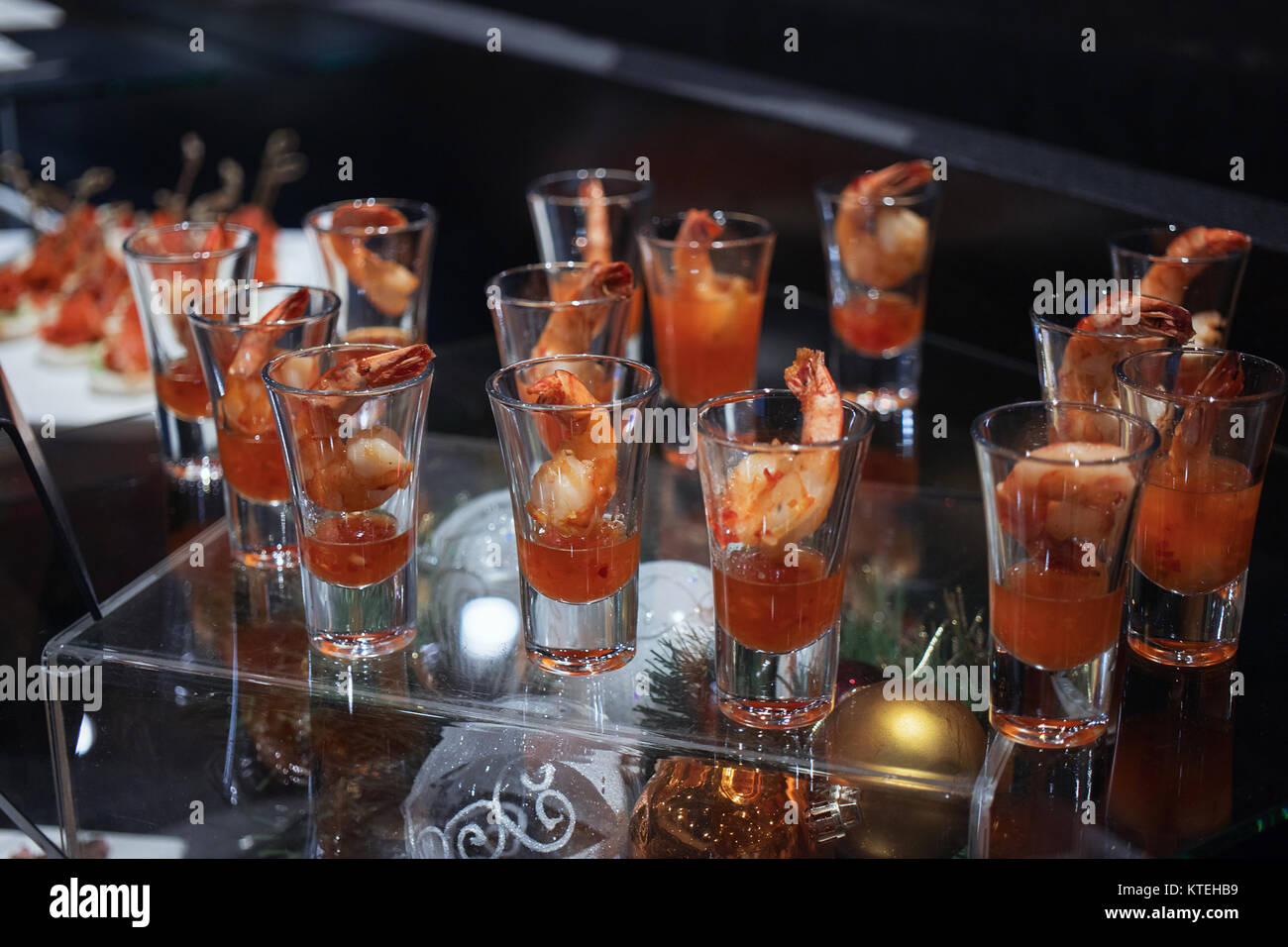 Shrimp cocktail in shot glass shot closeup Stock Photo - Alamy