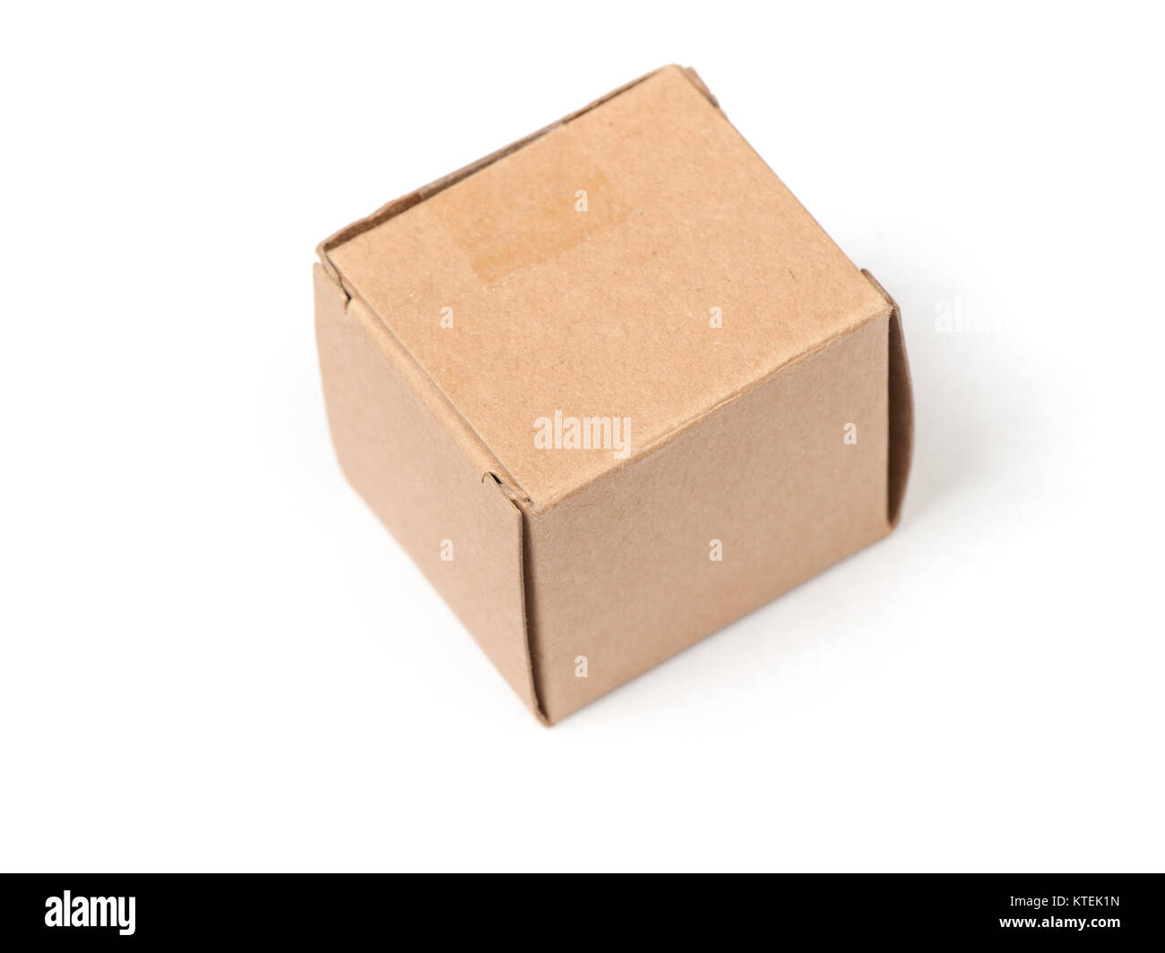 Small cardboard box isolated on white background Stock Photo - Alamy