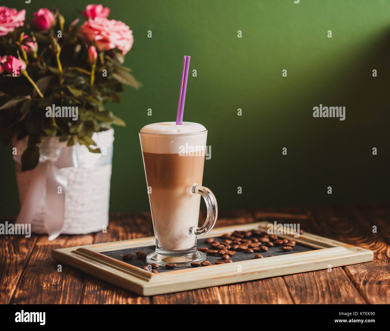 Latte on the chalking board tray, vintage still life Stock Photo - Alamy