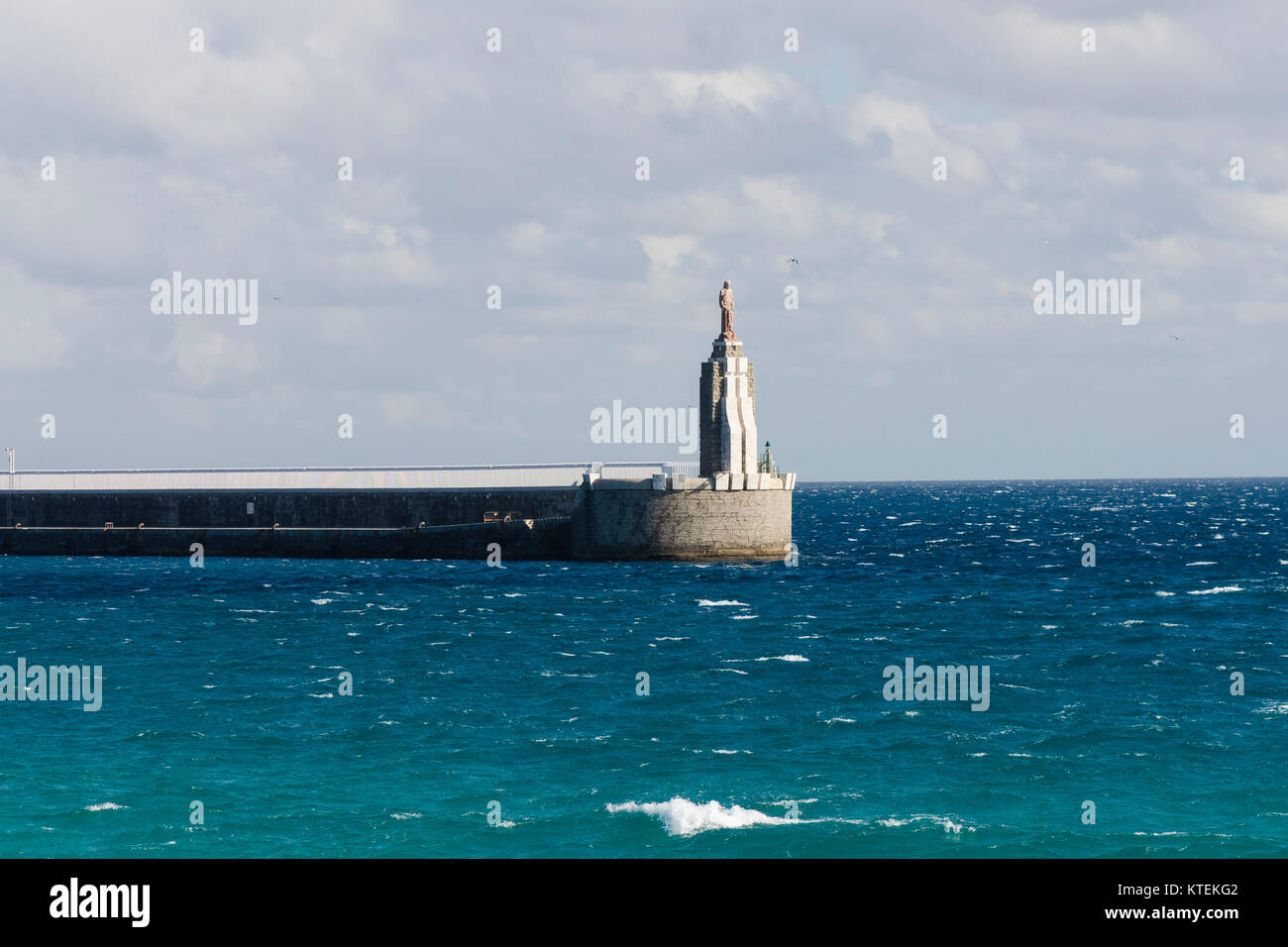 Statue of Jesus Christ at the port entrance, Tarifa, Cadiz, Andalusia ...