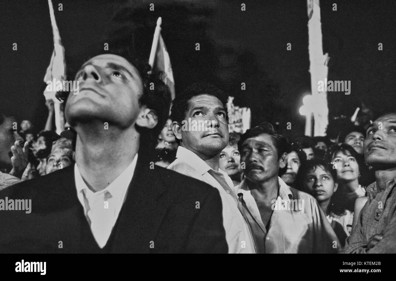 Crowds at a political rally watching future President Fujimori speak ...