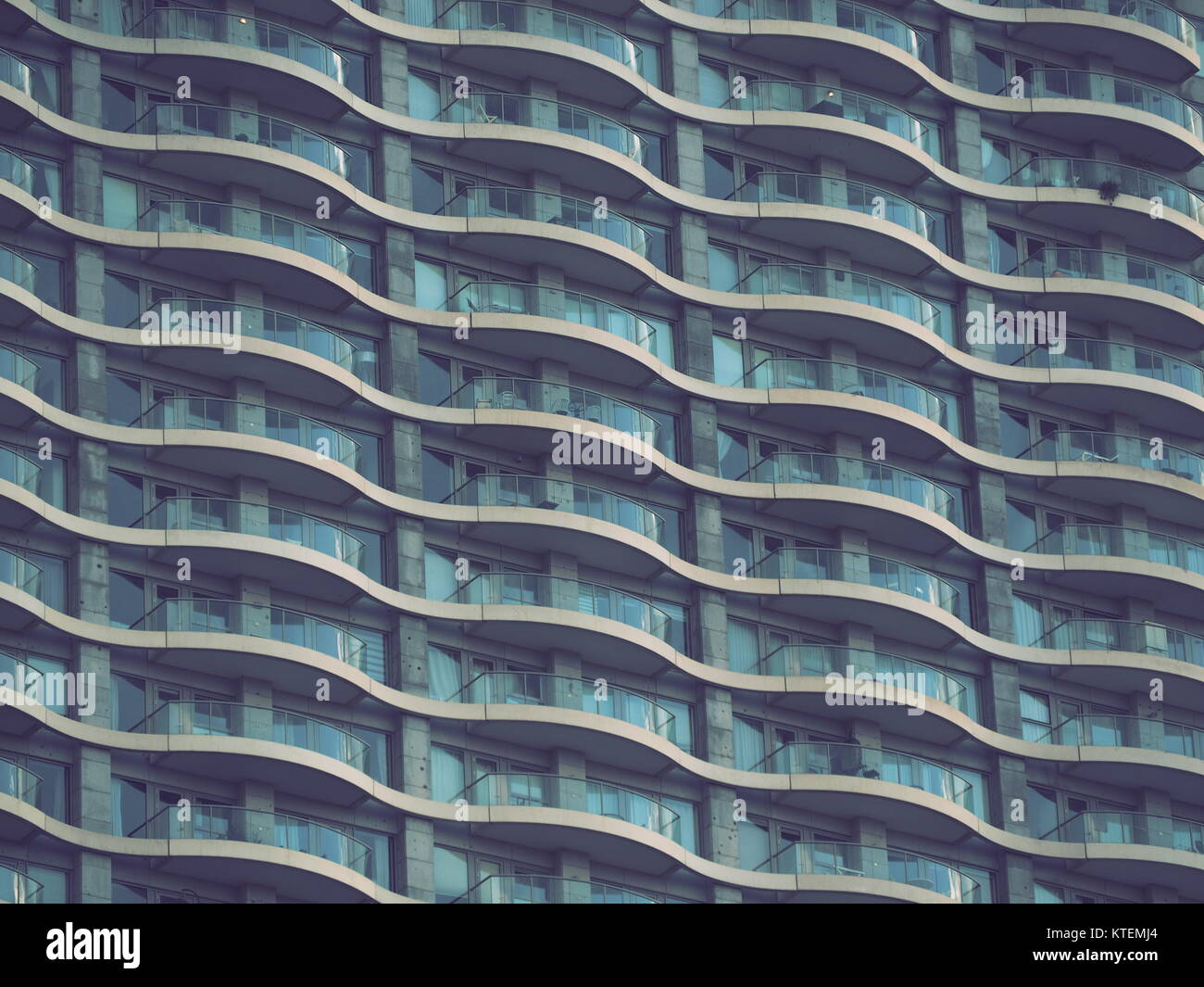 modern residence building facade with waves form balconies Stock Photo ...
