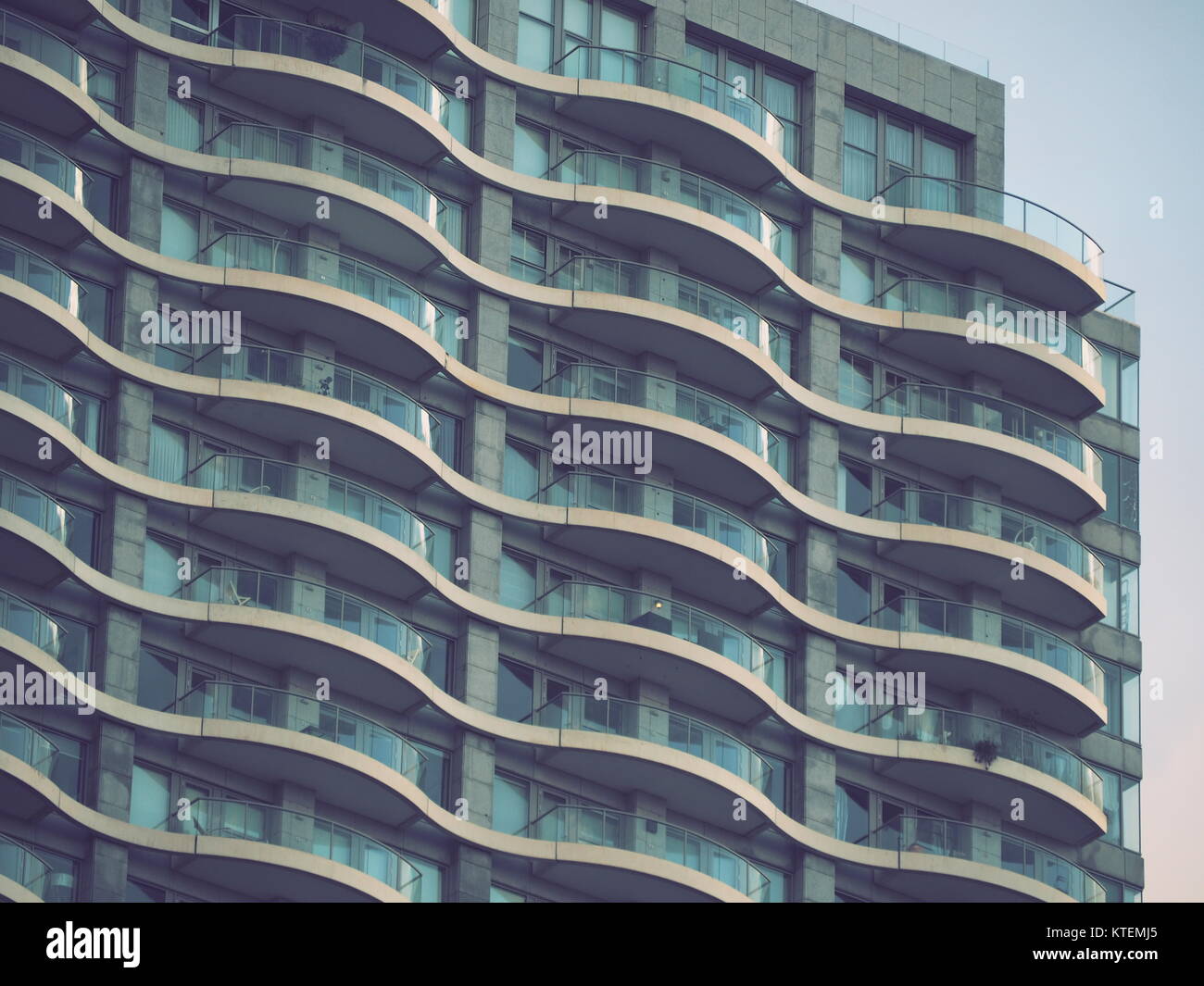 modern residence building facade with waves form balconies Stock Photo ...