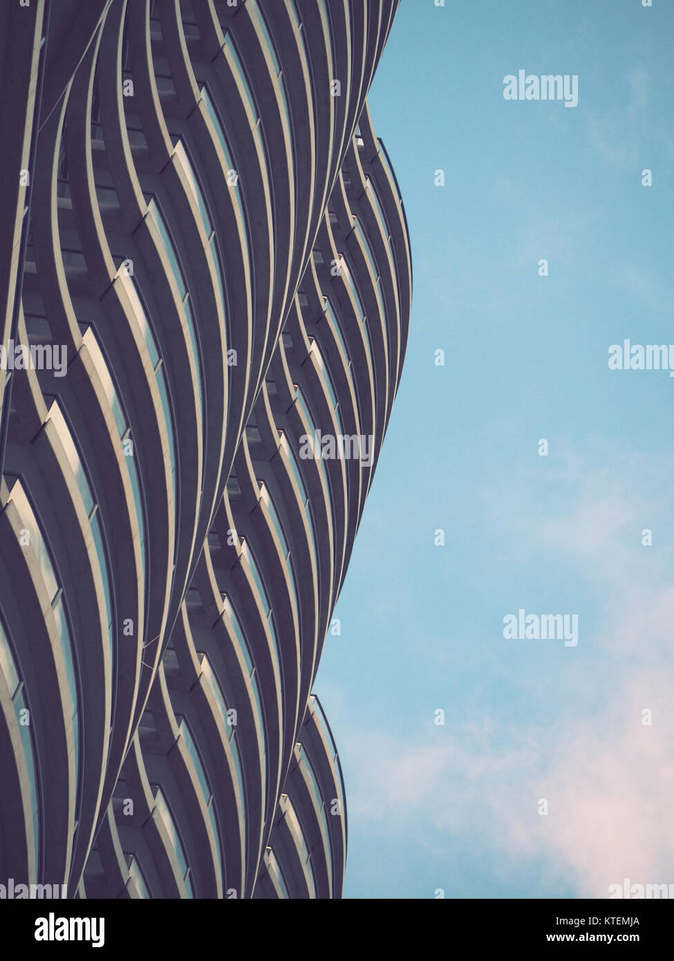 modern residence building facade with waves form balconies Stock Photo ...