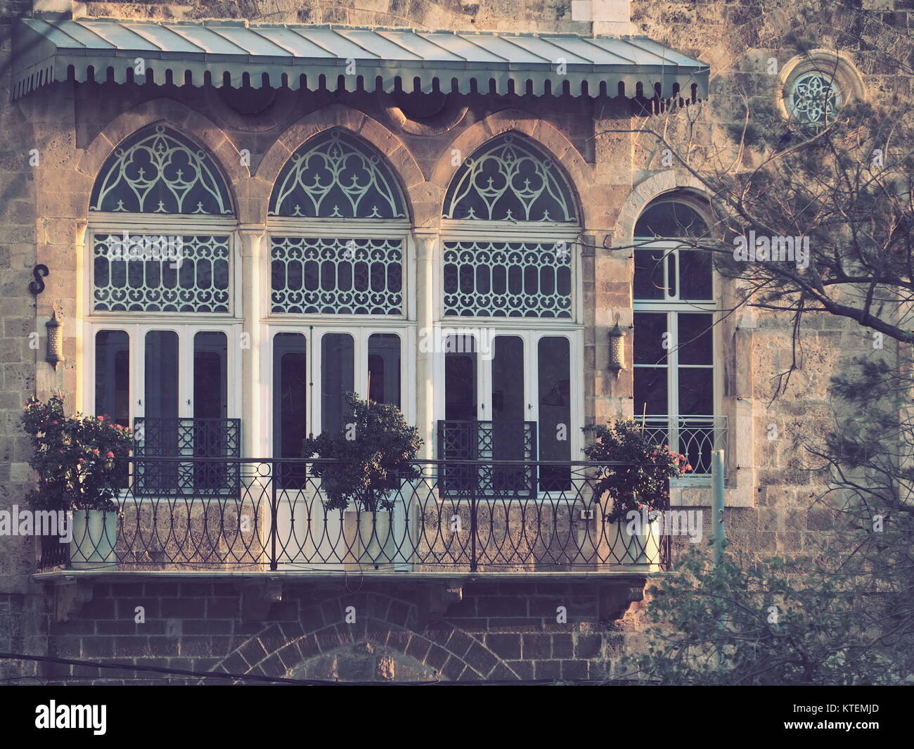 old classic residence house with stone walls balcony and decorations ...