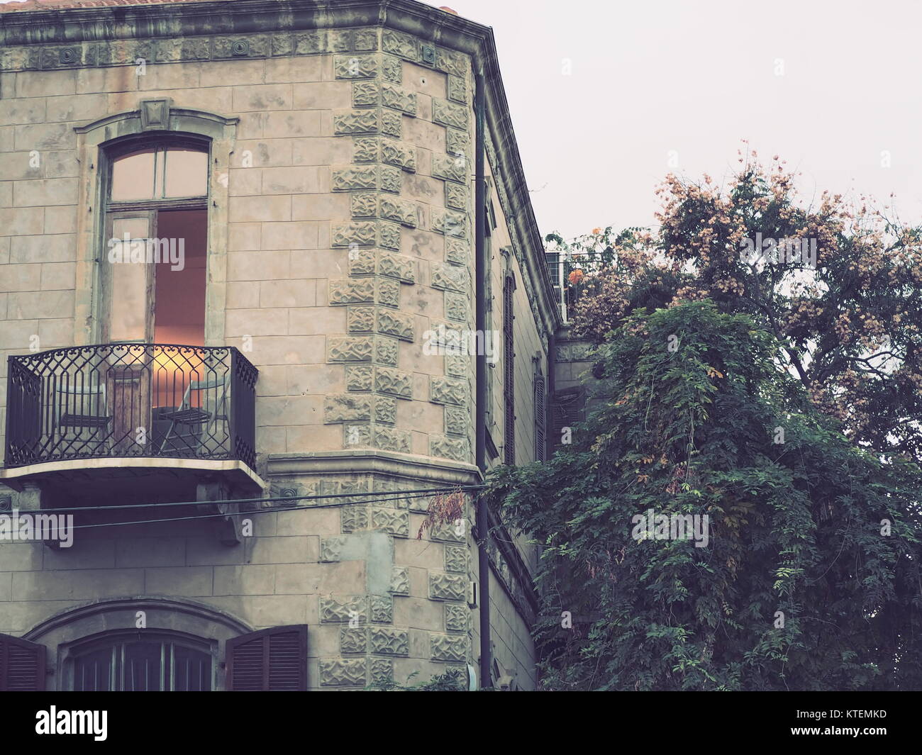 old classic residence house with stone walls balcony and decorations ...
