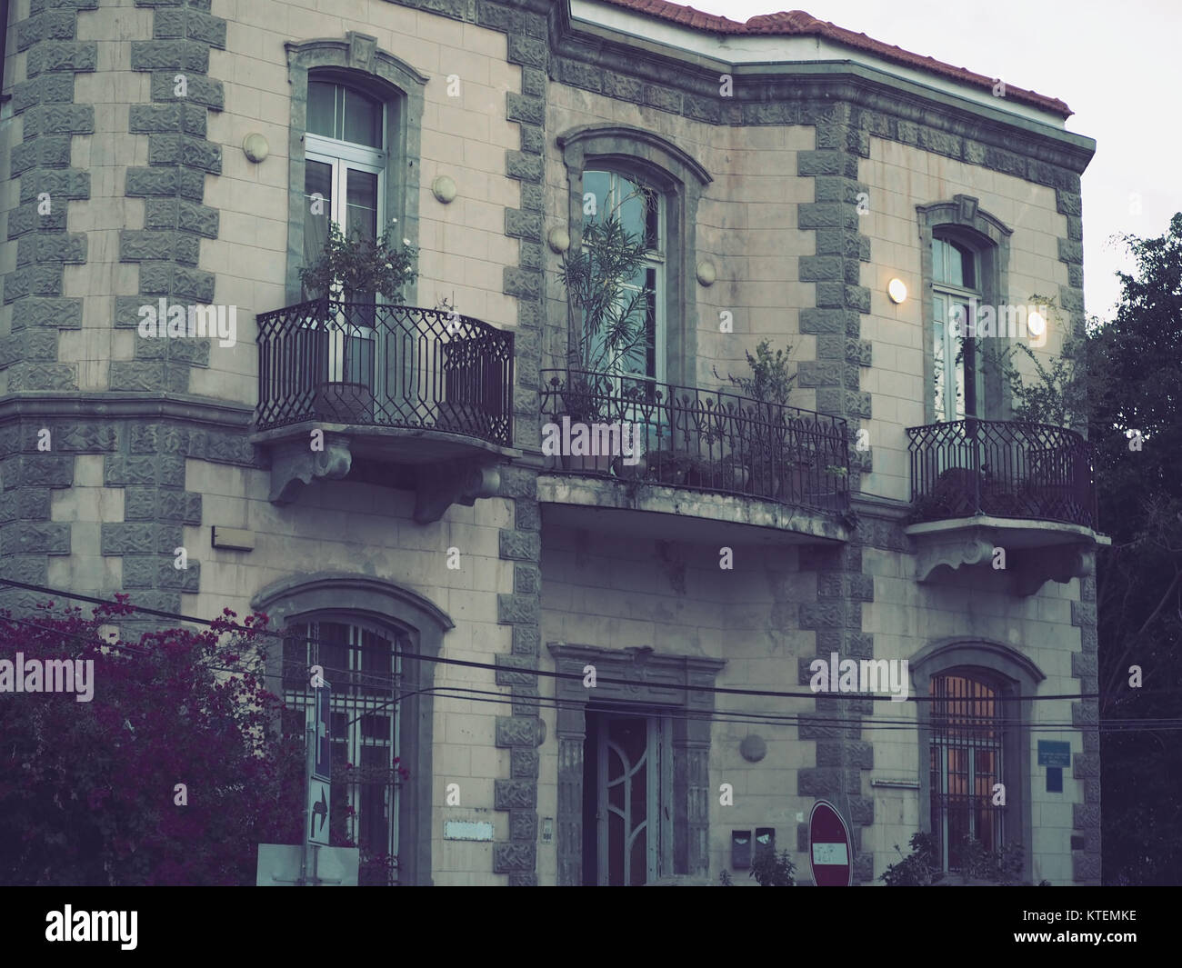 old classic residence house with stone walls roof tiles balcony and ...