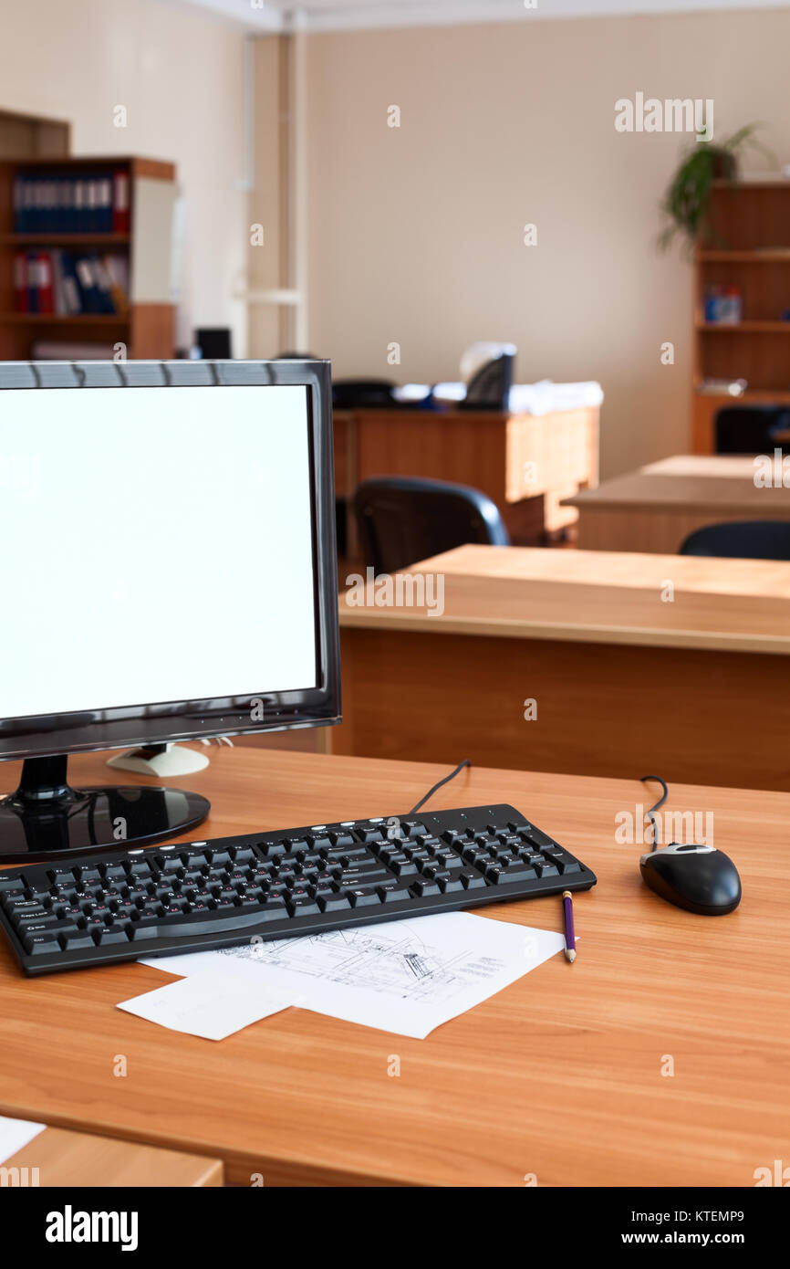 Flat lcd computer monitor with white isolated screen, empty office room ...