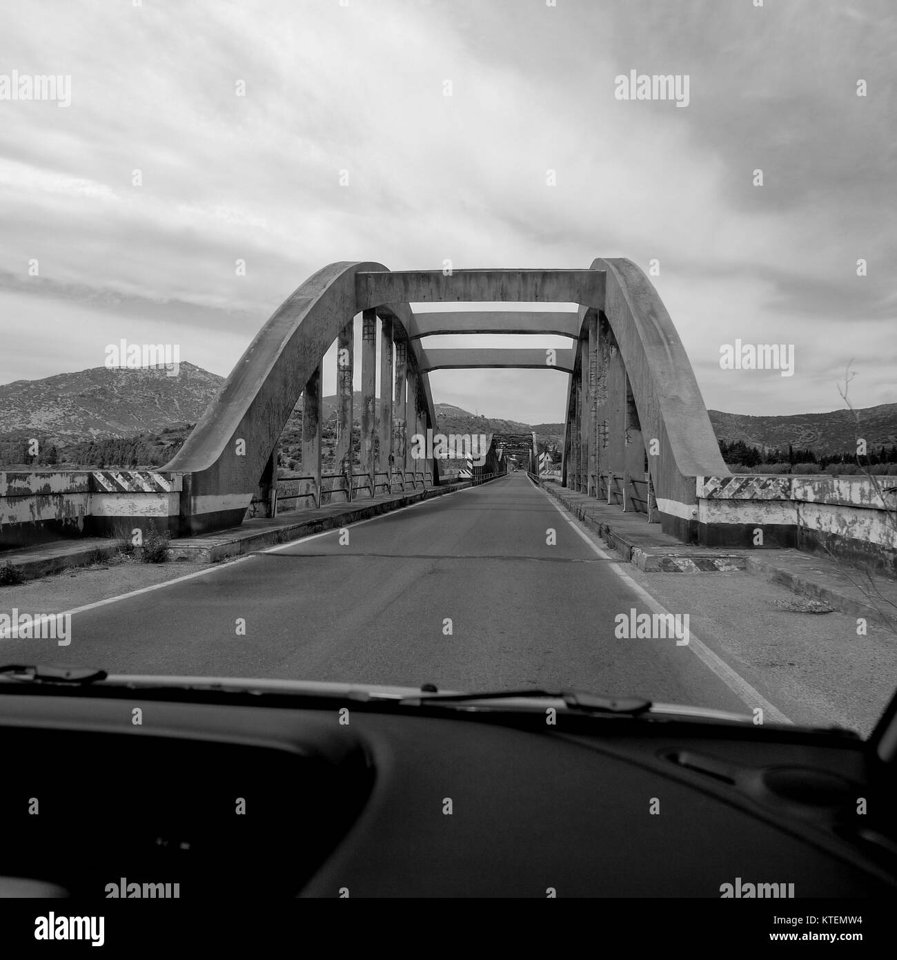Metal bridge leading to San Vito city, Sardinia, Italy Stock Photo - Alamy