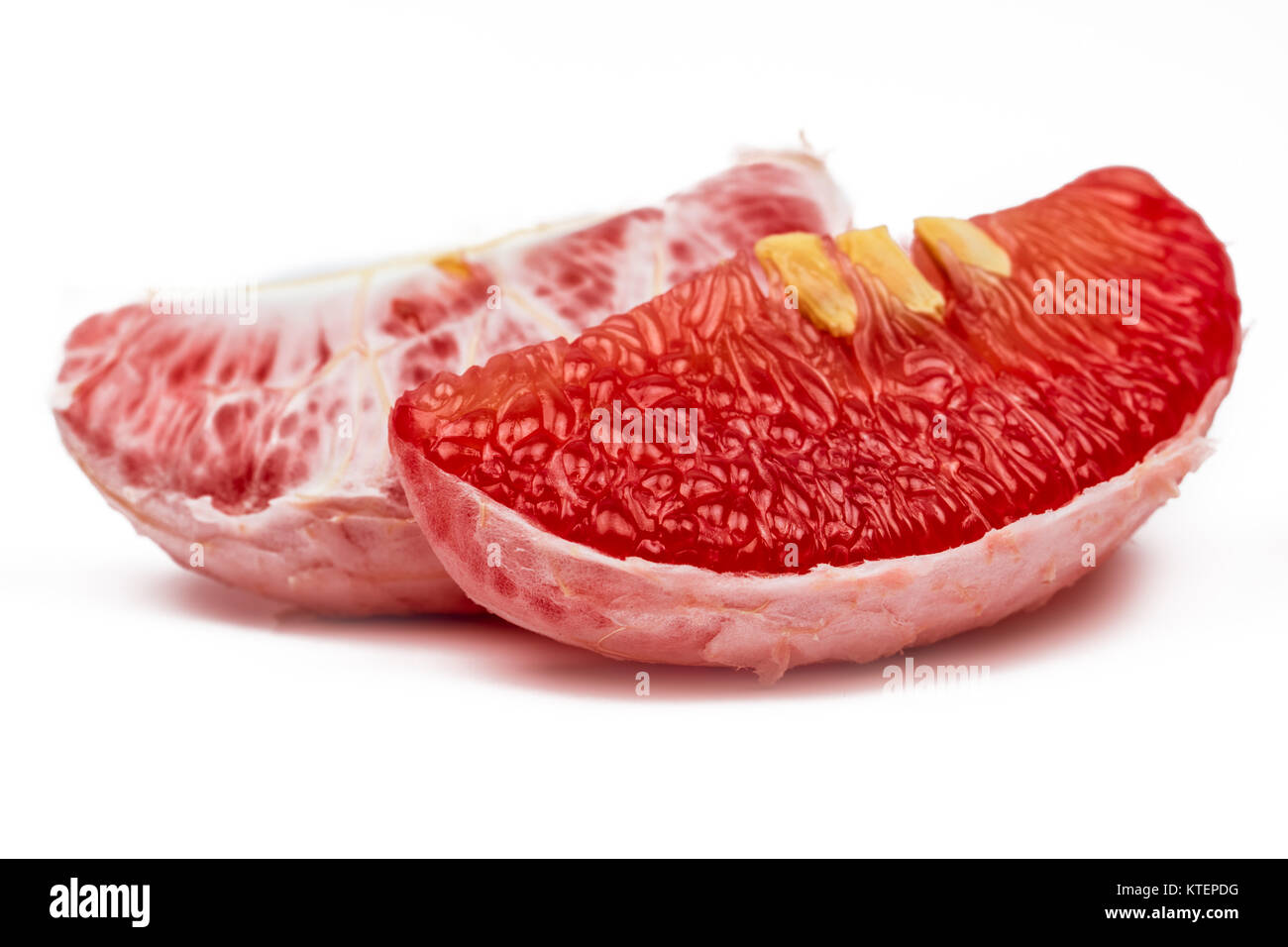 Red pomelo pulp with seeds isolated on white background. Thailand Siam ...