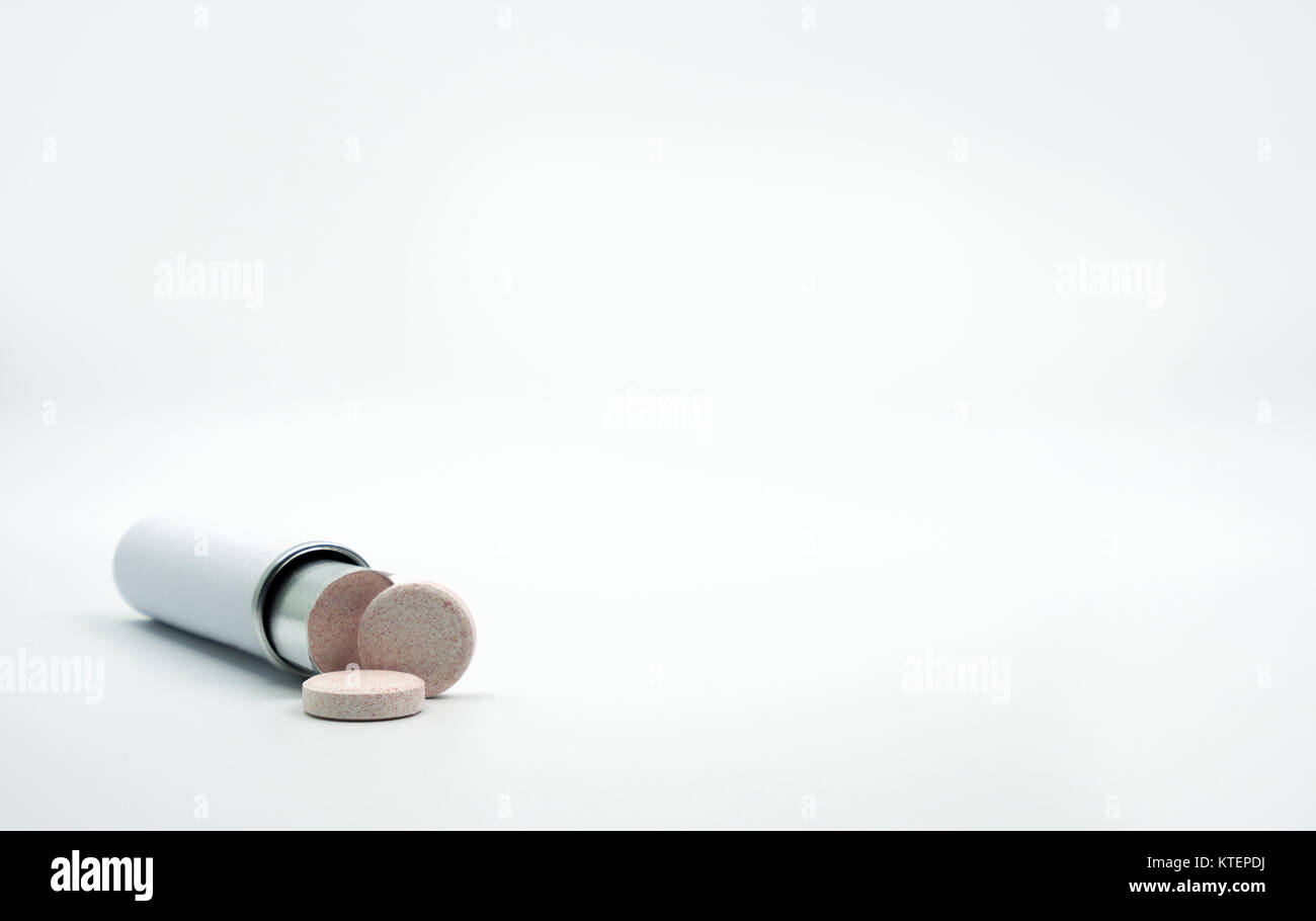 Effervescent tablets tube with blank label and copy space on white ...