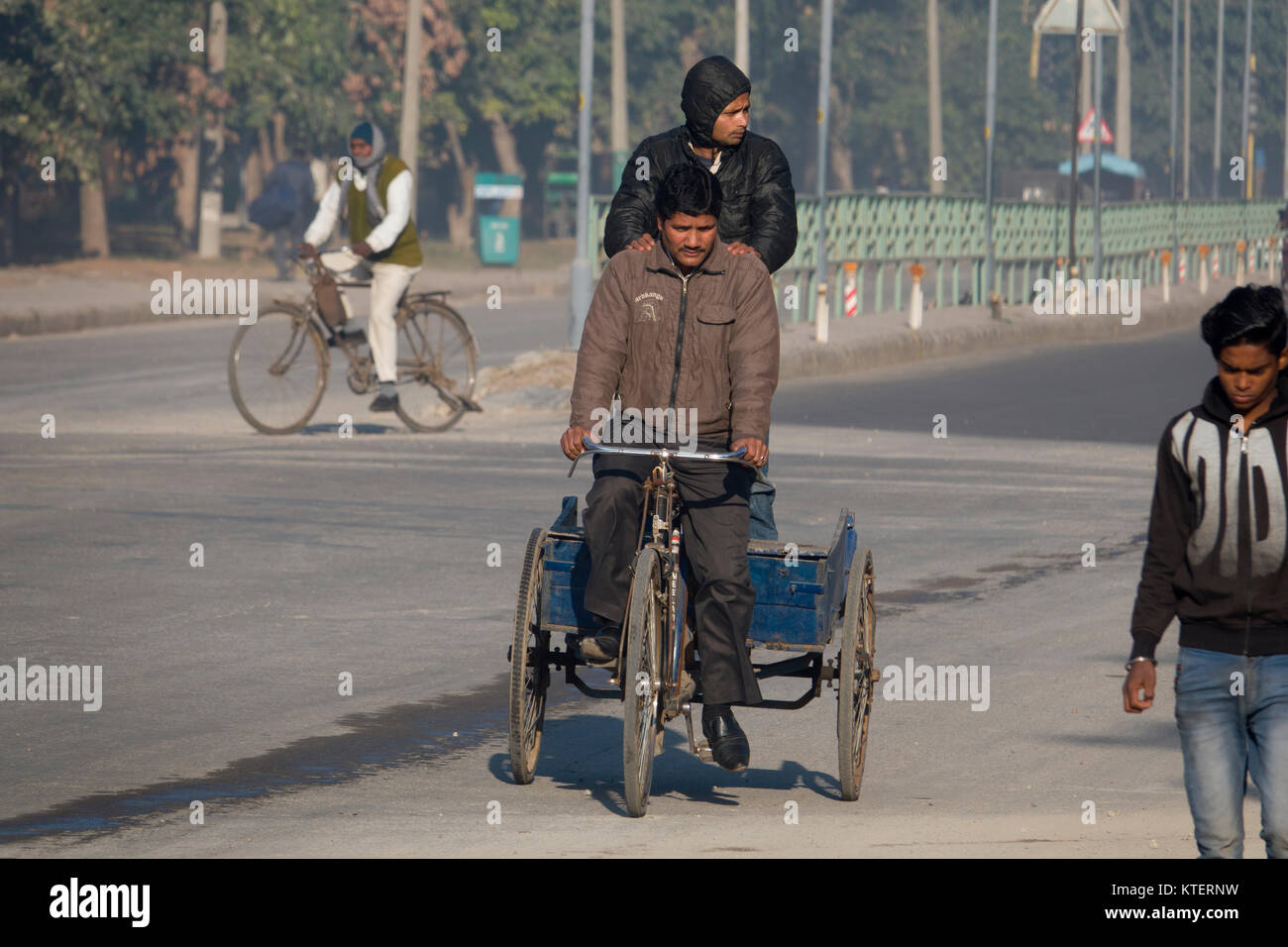 Men riding tricycle in Chandigarh, Punjab, India Stock Photo - Alamy
