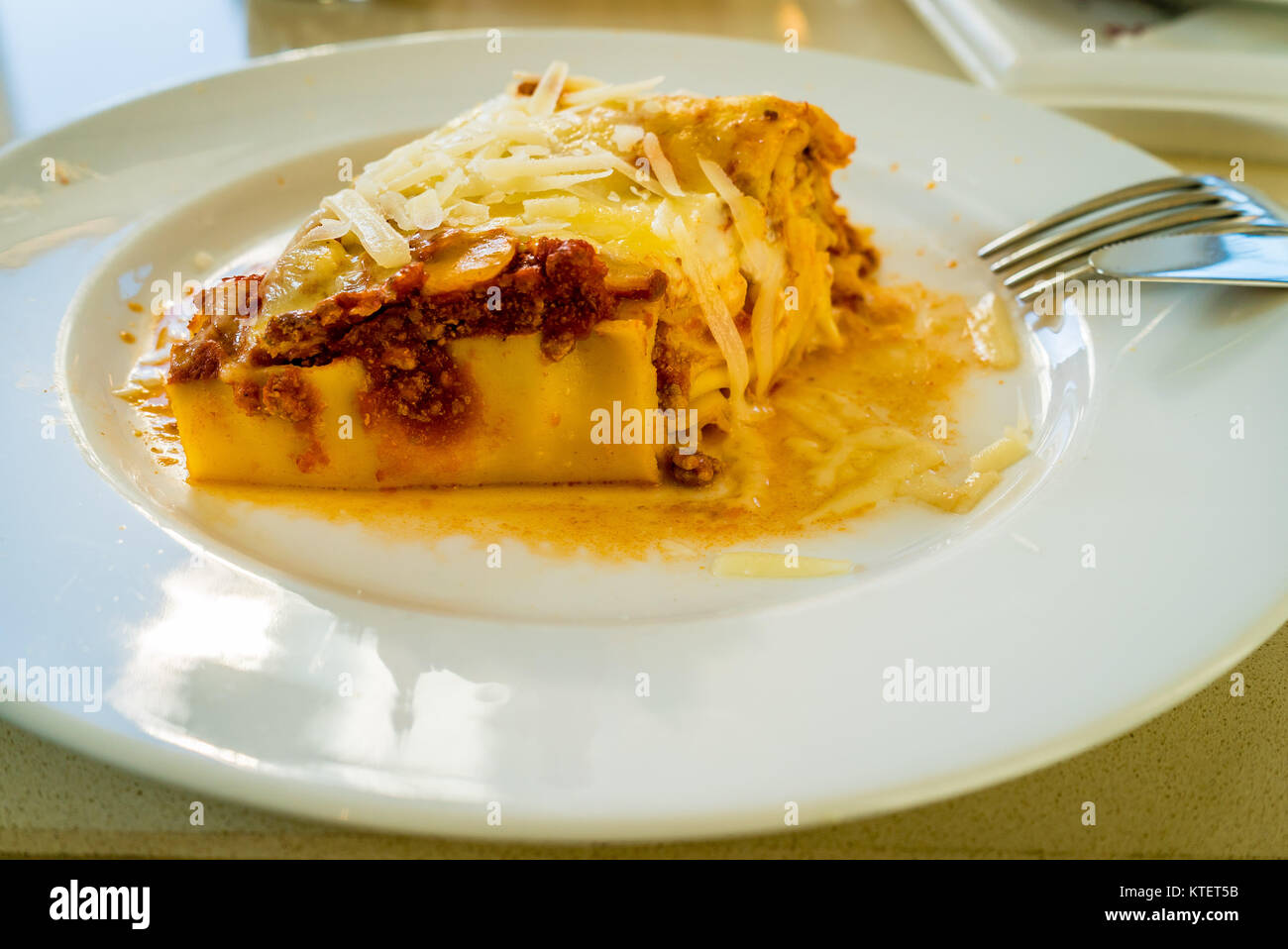 Close up shot of Italian lasagna on plate as they are served in Rome ...