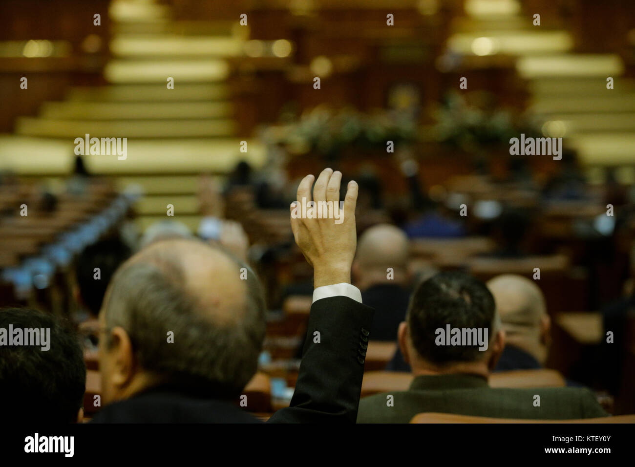 Members of Romanian Parliament voting by raising their hands Stock ...