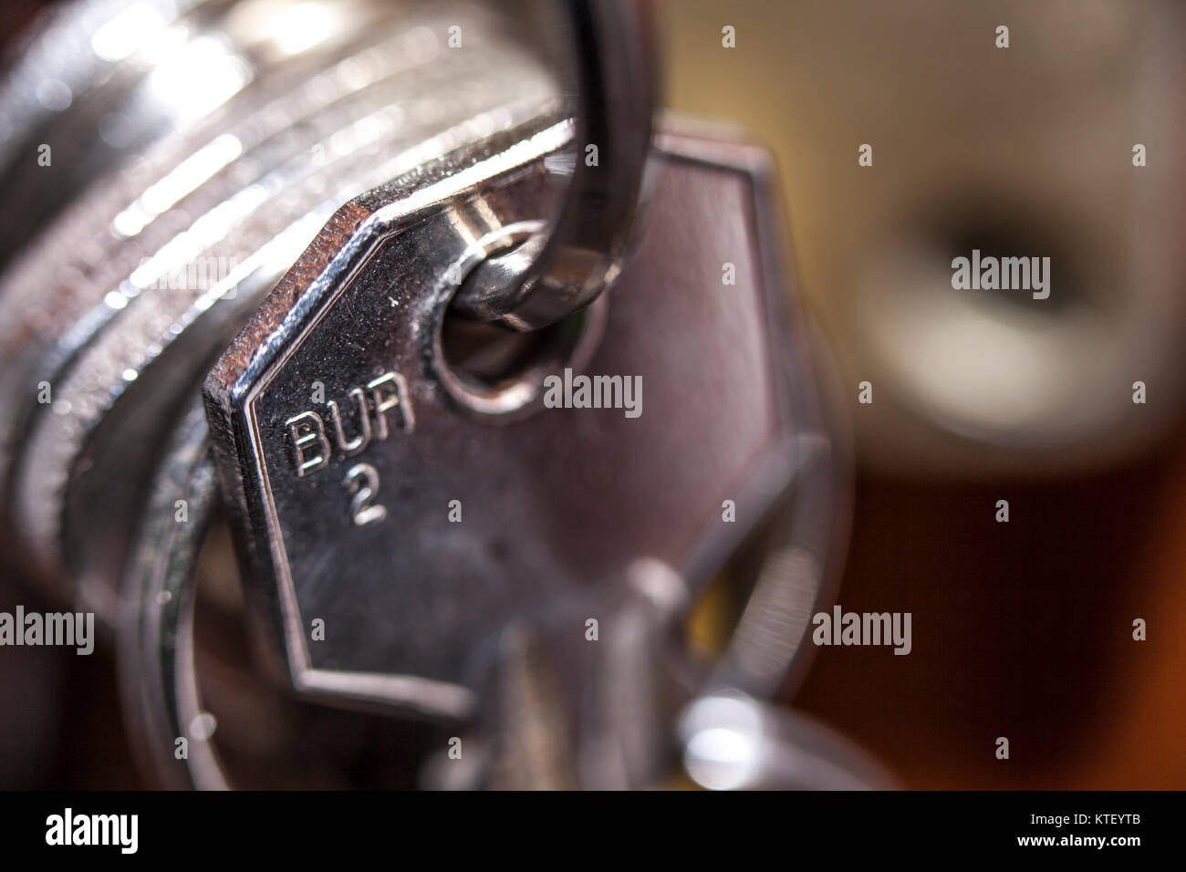 frontal view of a lock with key in Stock Photo - Alamy