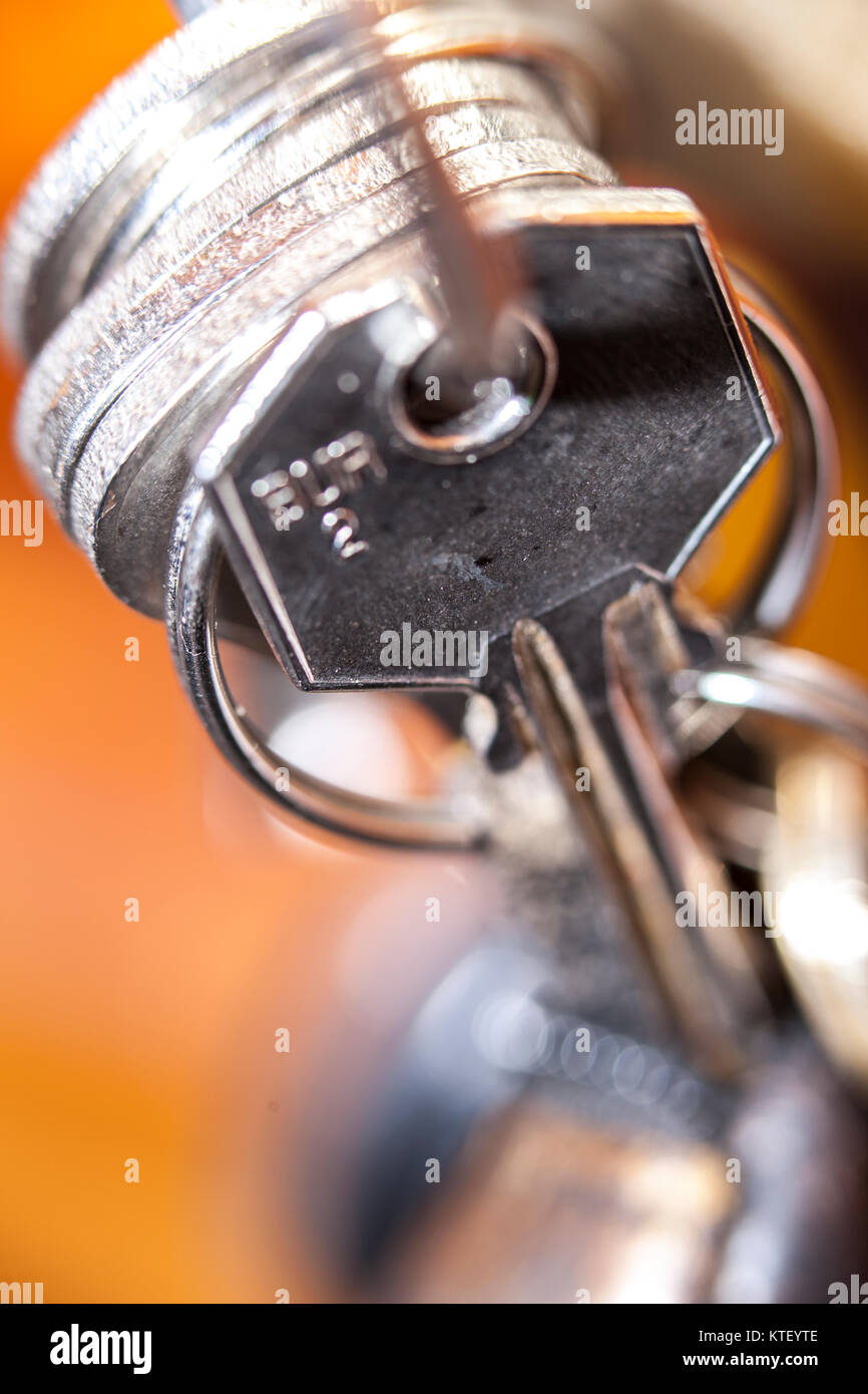 frontal view of a lock with key in Stock Photo - Alamy