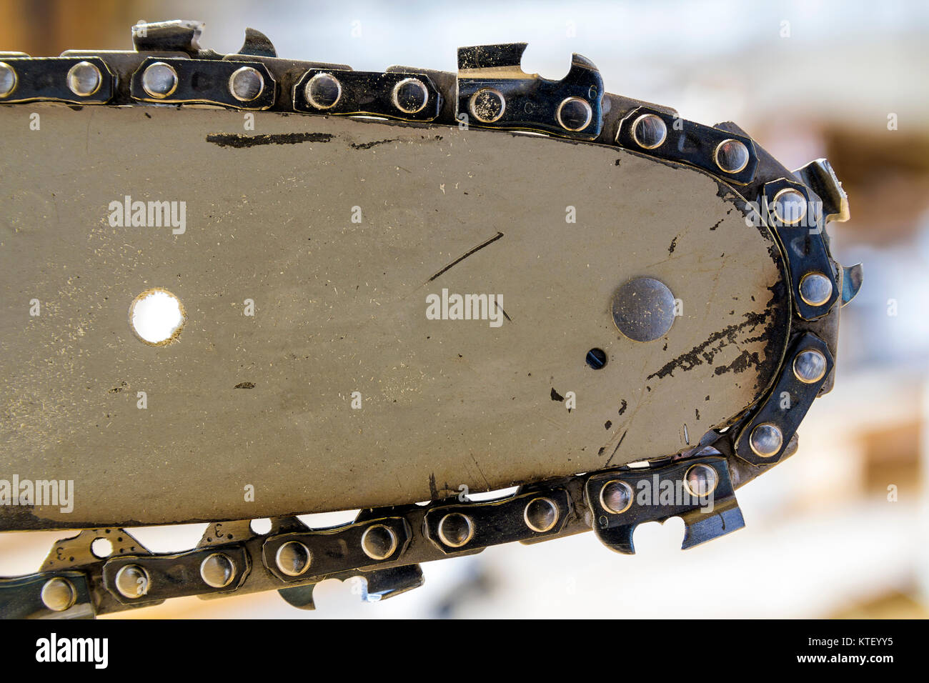Closeup view of a chainsaw bar and cutting chain Stock Photo - Alamy