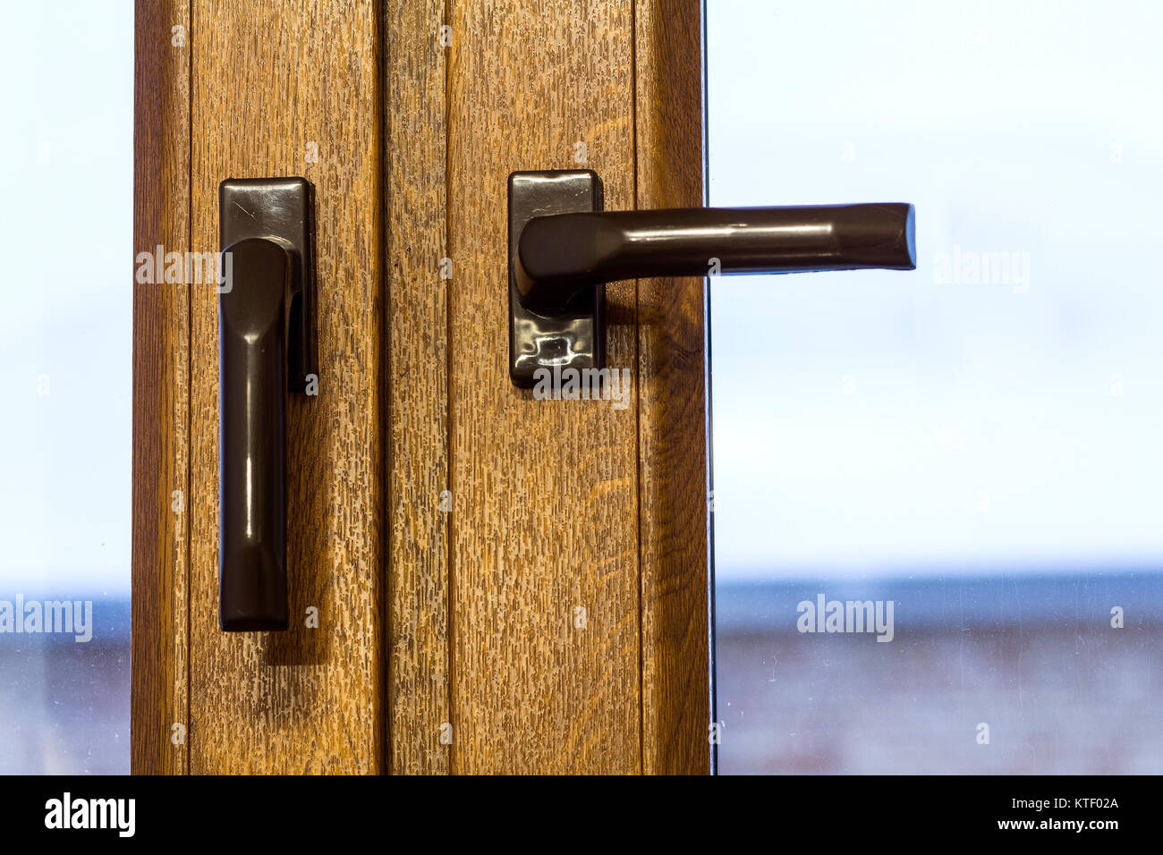Wooden modern window handle. Home interior detail Stock Photo - Alamy