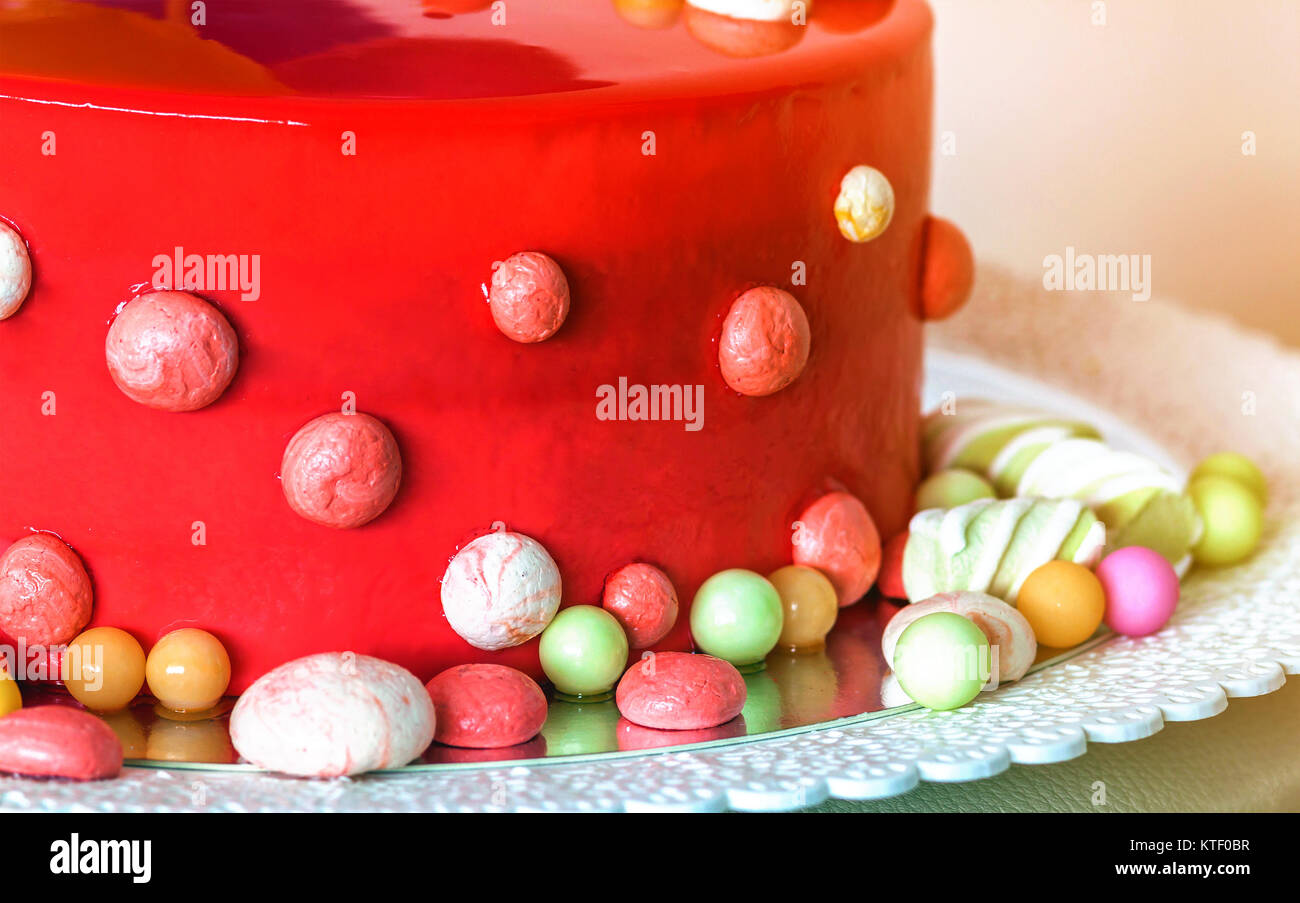Homemade red birthday cake with air baloons Stock Photo - Alamy