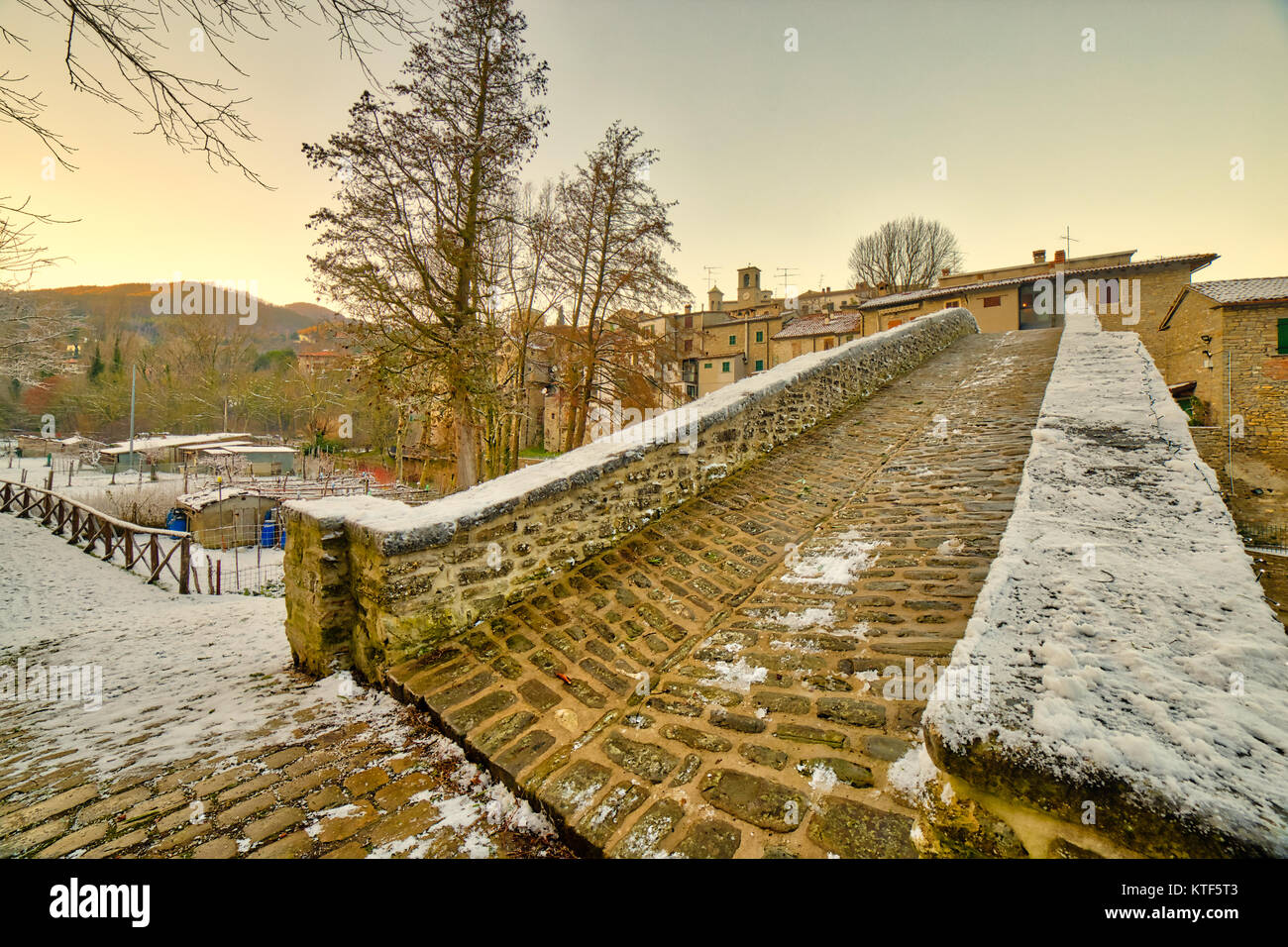 Ancient medieval donkey-back bridge with a unique arch in a village in ...