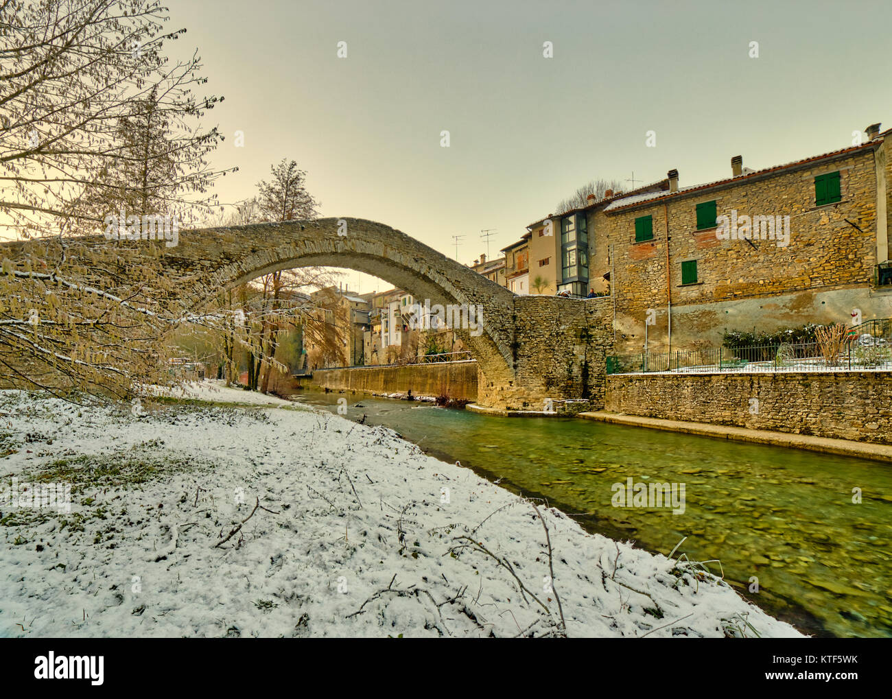 Ancient medieval donkey-back bridge with a unique arch in a village in ...