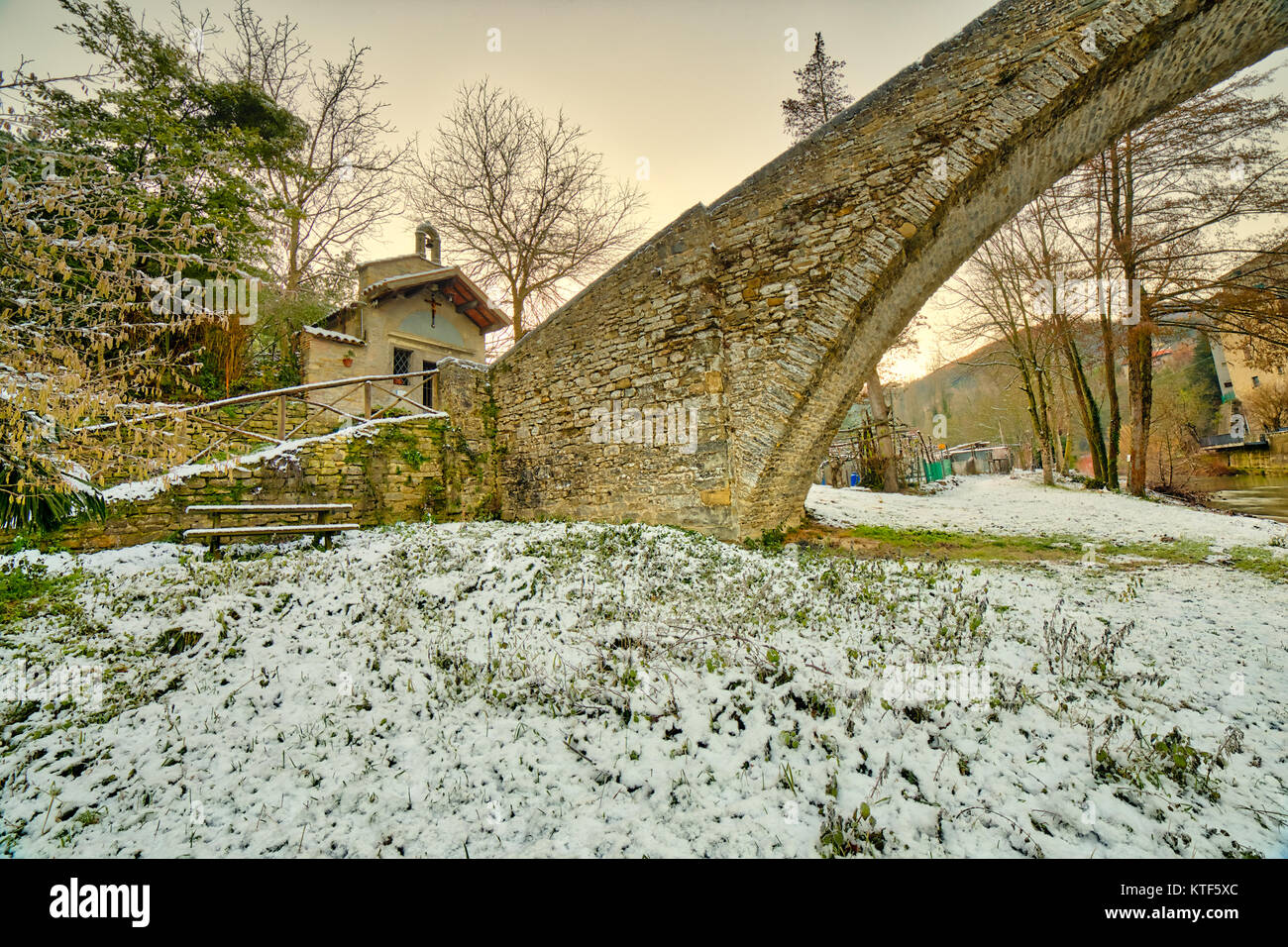 Ancient medieval donkey-back bridge with a unique arch in a village in ...