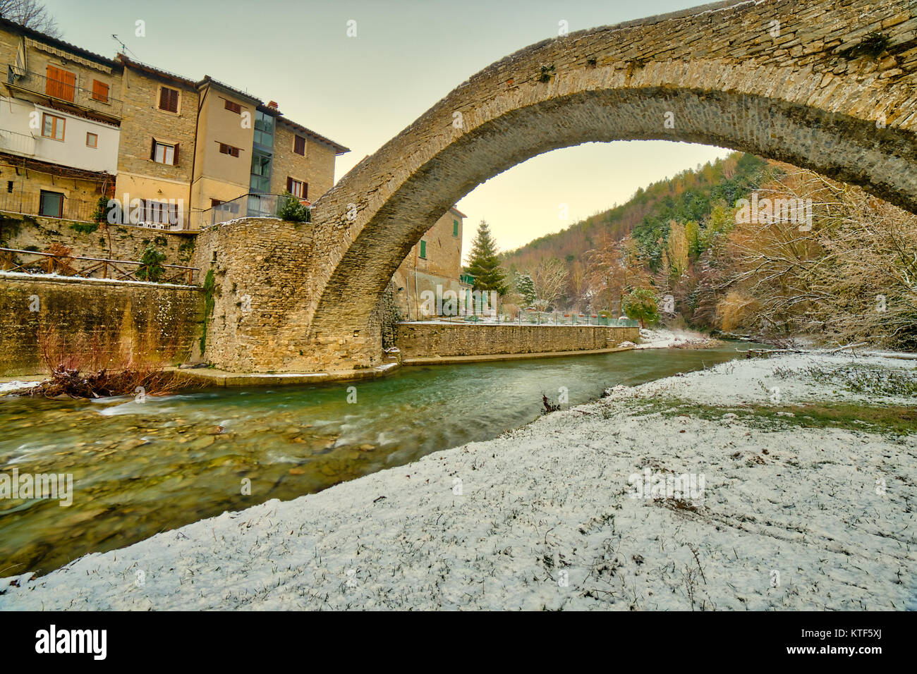 Ancient medieval donkey-back bridge with a unique arch in a village in ...