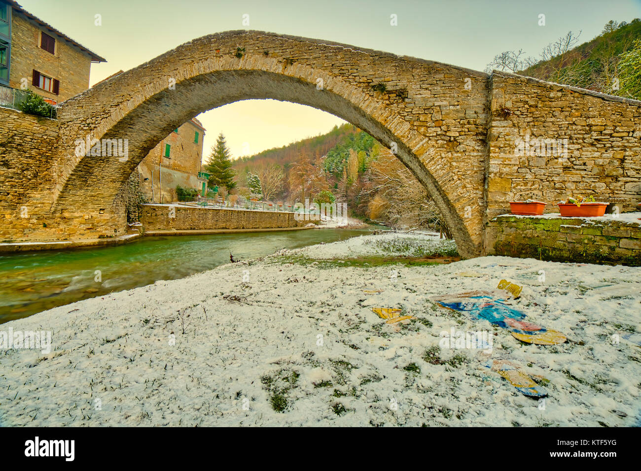 Ancient medieval donkey-back bridge with a unique arch in a village in ...