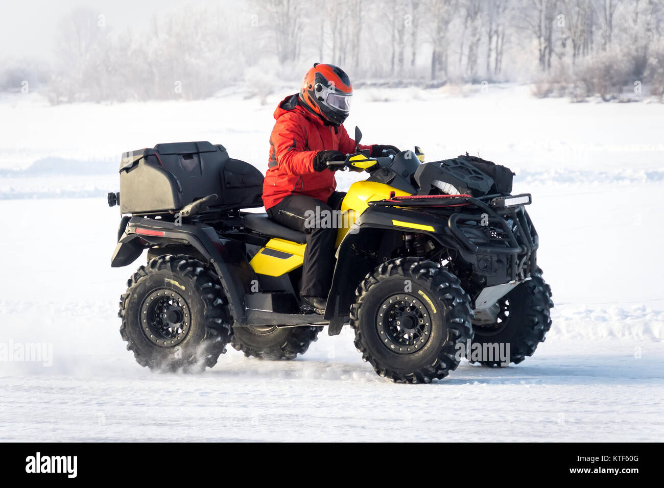 Man on quad with helmet hi-res stock photography and images - Alamy