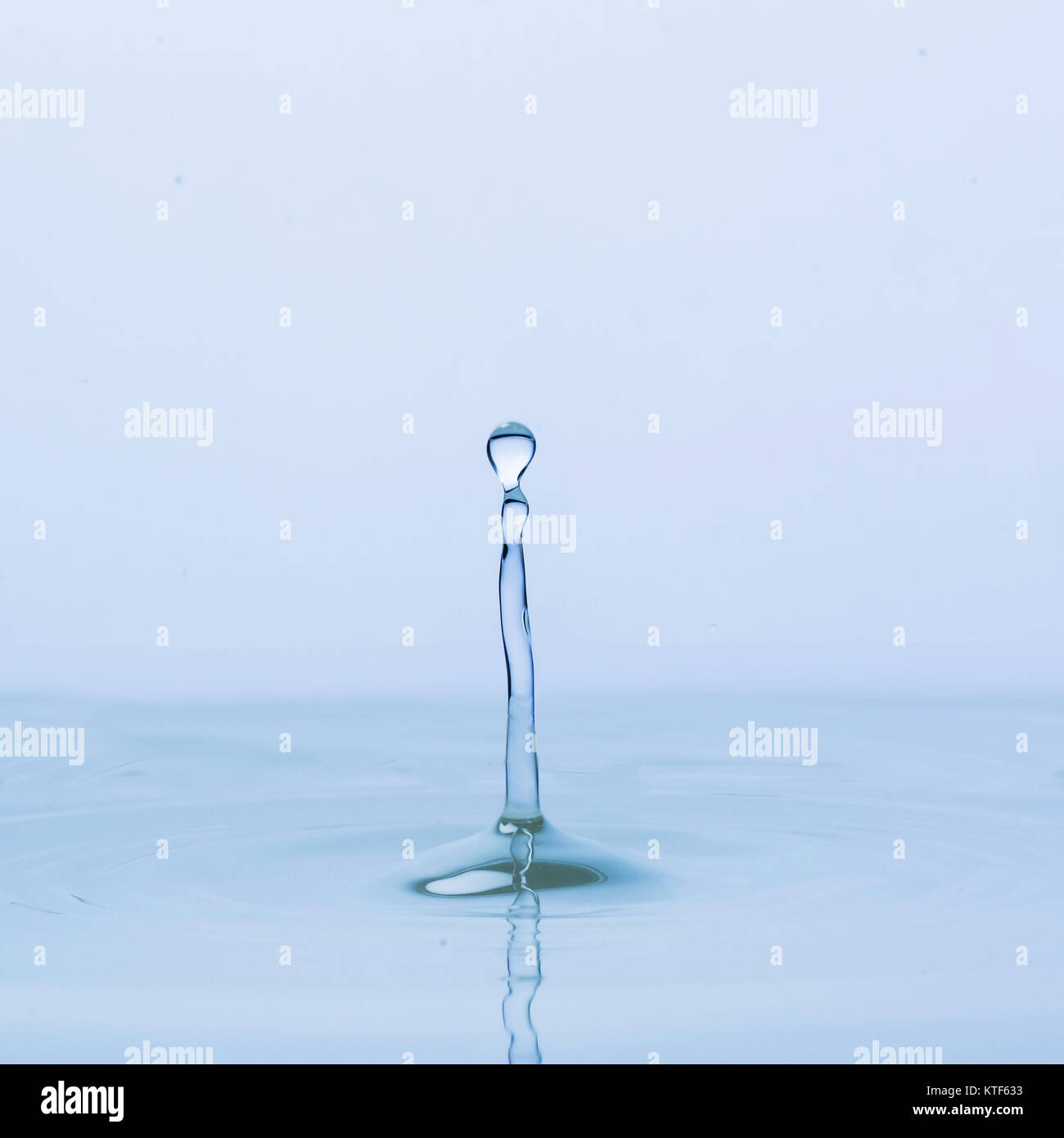 Blue water drop falling down hi-res stock photography and images - Alamy