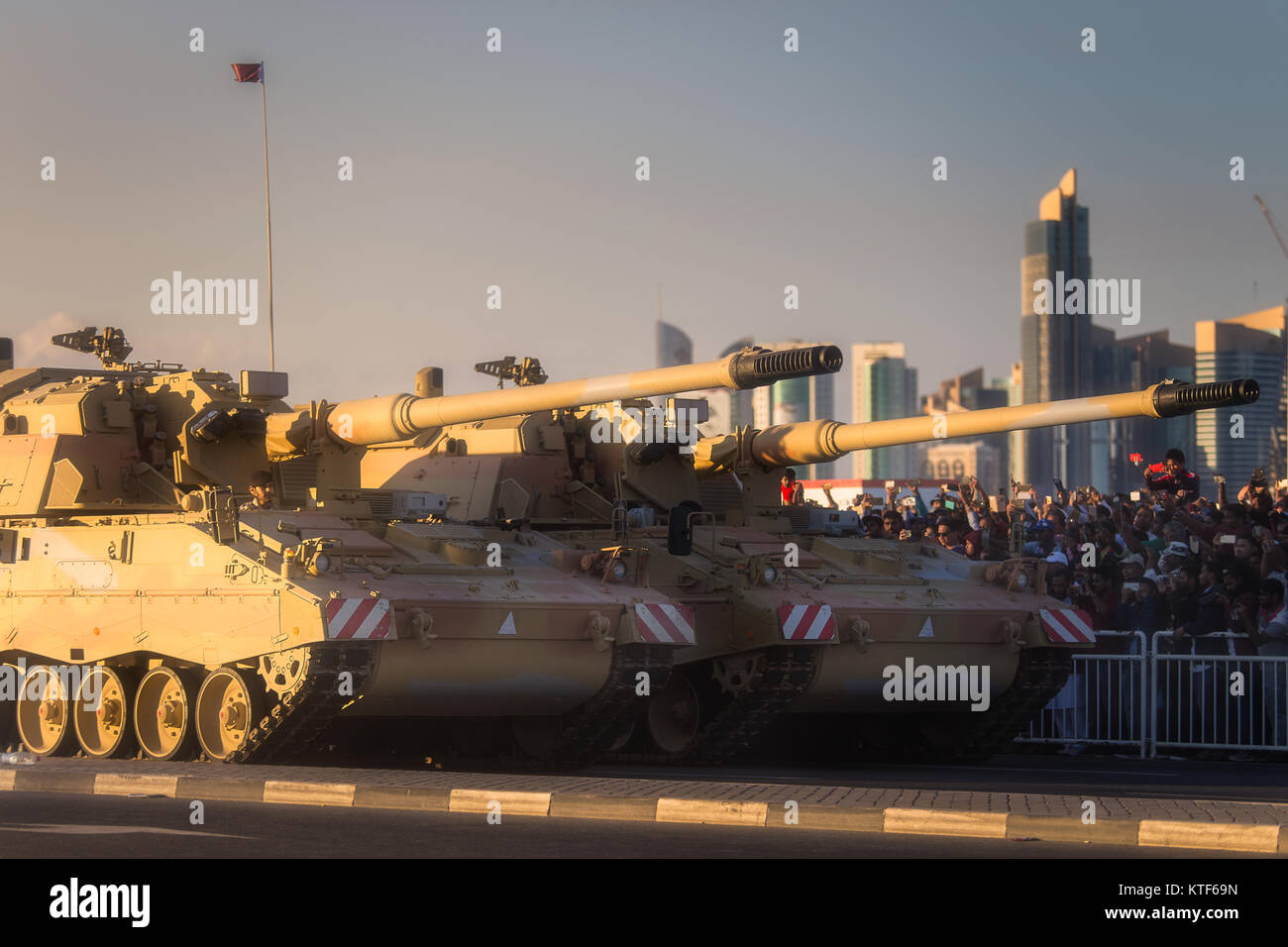 Perform of military and civil vehicles on National Day parade Doha ...