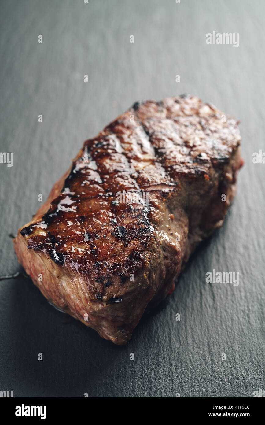 prepared beef steack on slate board closeup Stock Photo - Alamy
