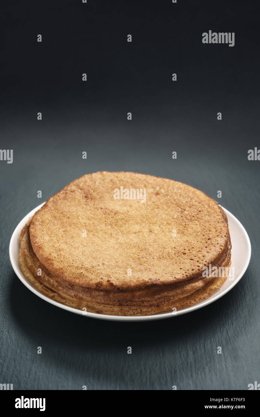 homemade crepes on plate on slate board Stock Photo - Alamy