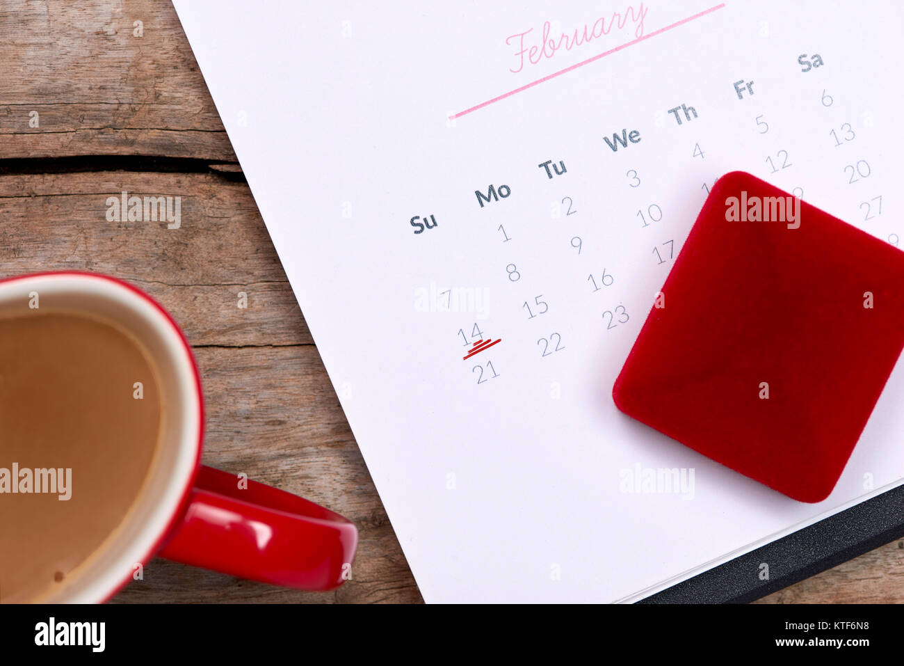 Calendar showing the date 14th of February. Red rose, hearts and gift ...
