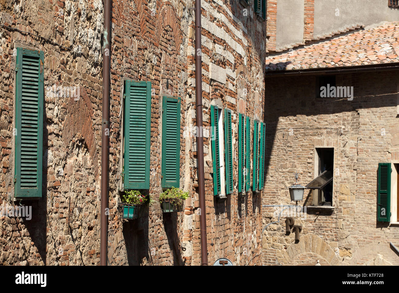 the narrow street in the Tuscan town Stock Photo - Alamy
