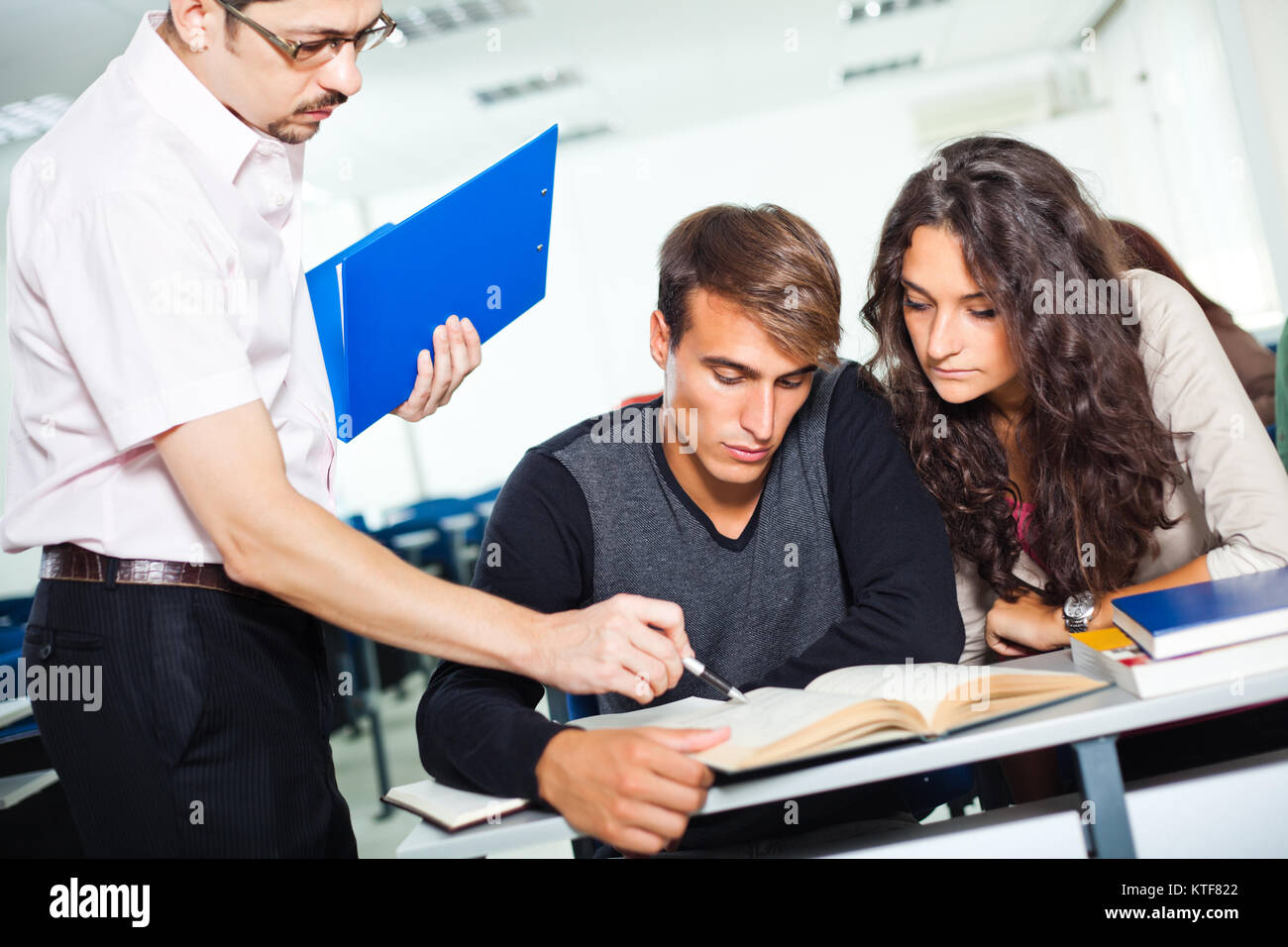 Students in class with professor Stock Photo - Alamy