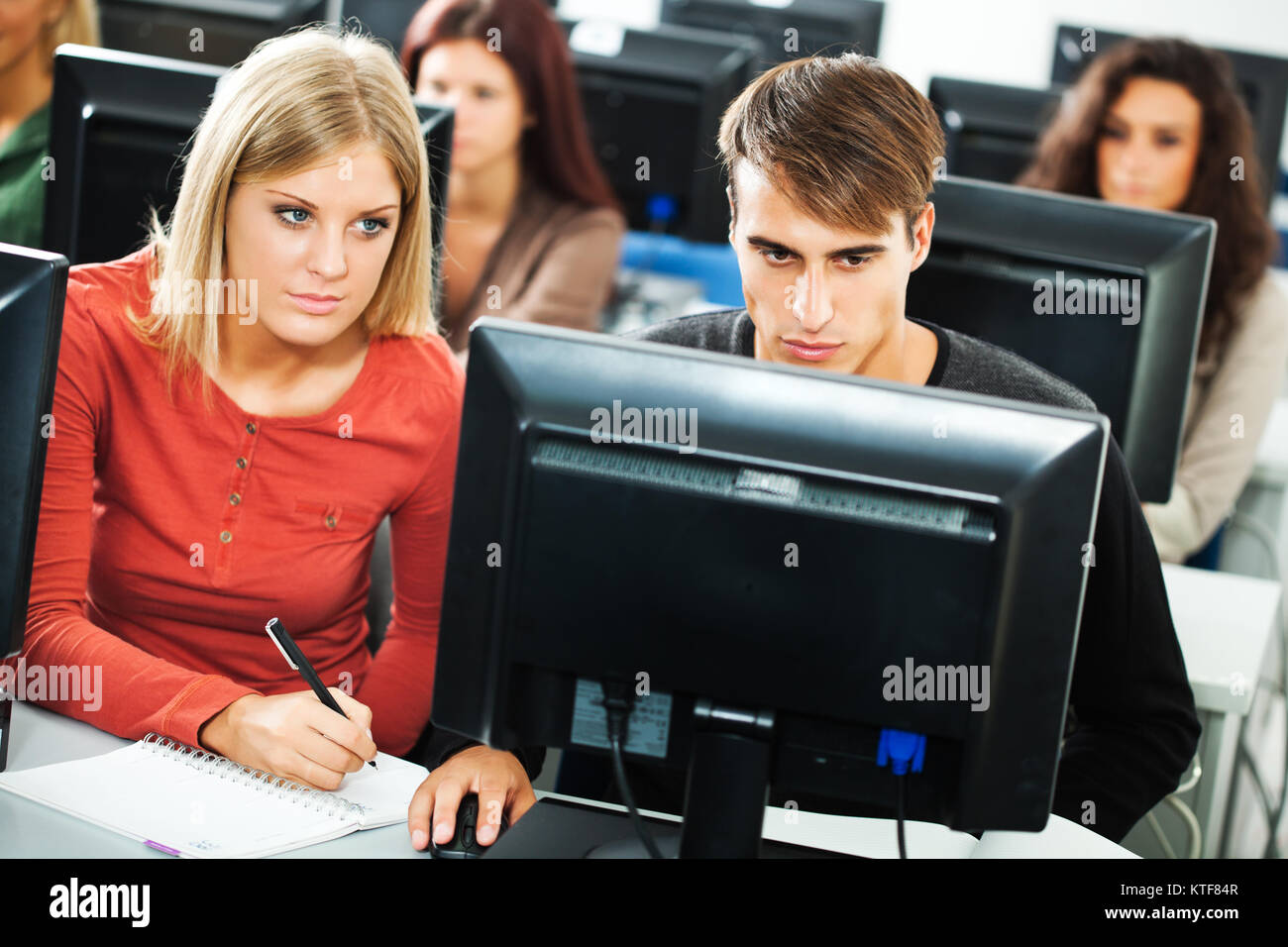 Students learning in computer lab Stock Photo - Alamy