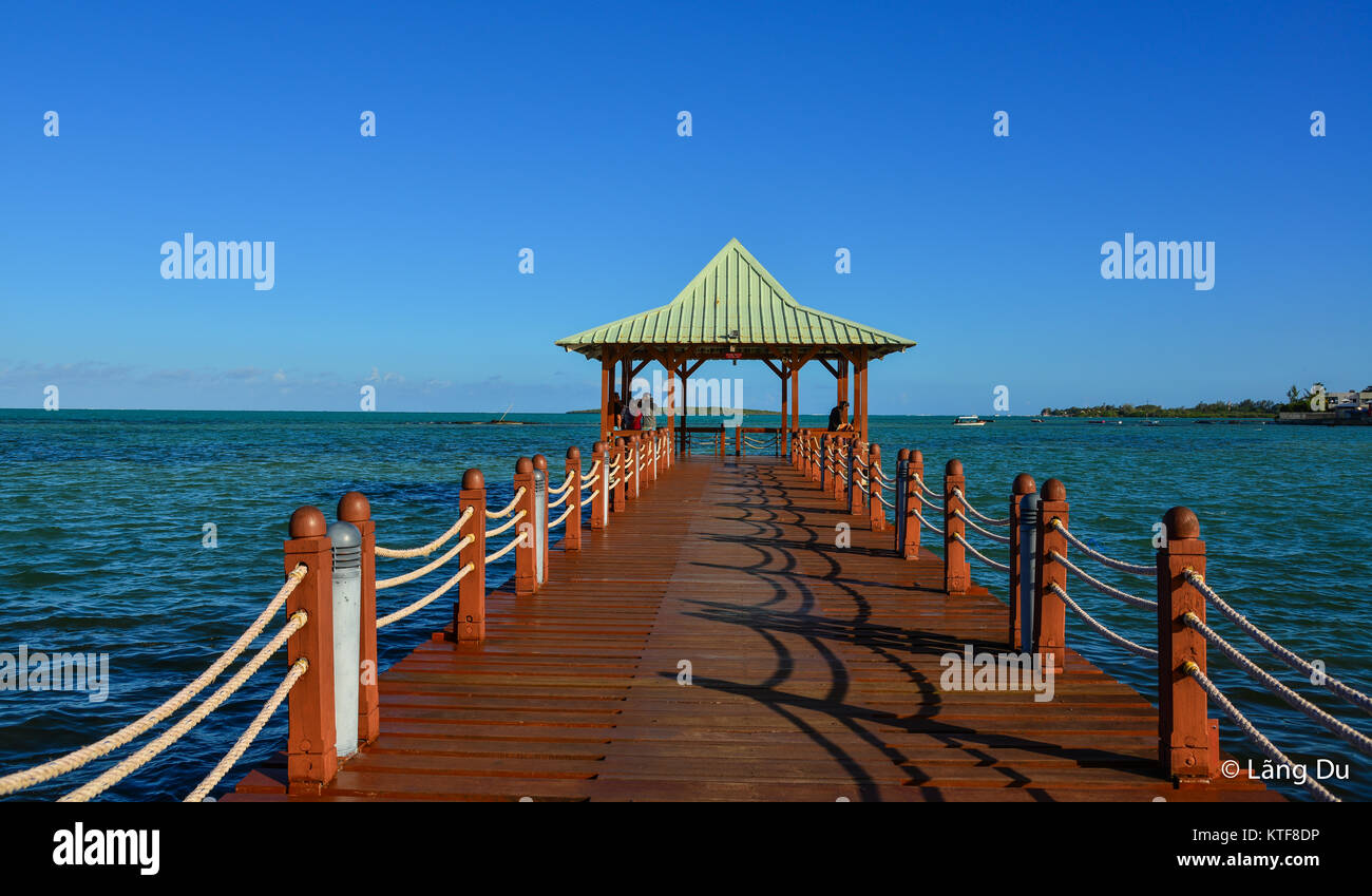 Mahebourg, Mauritius - Jan 3, 2017. Wooden bridge of pier in Mahebourg ...