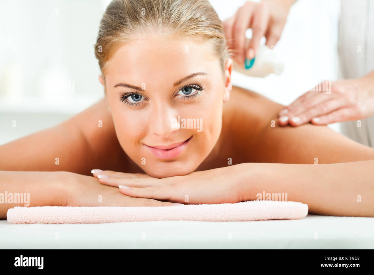 Young woman relaxing on spa treatment Stock Photo - Alamy