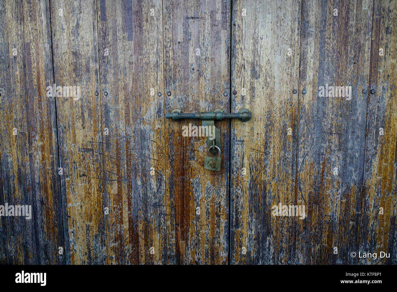 Old wooden door with the lock in Mahebourg, Mauritius Stock Photo - Alamy