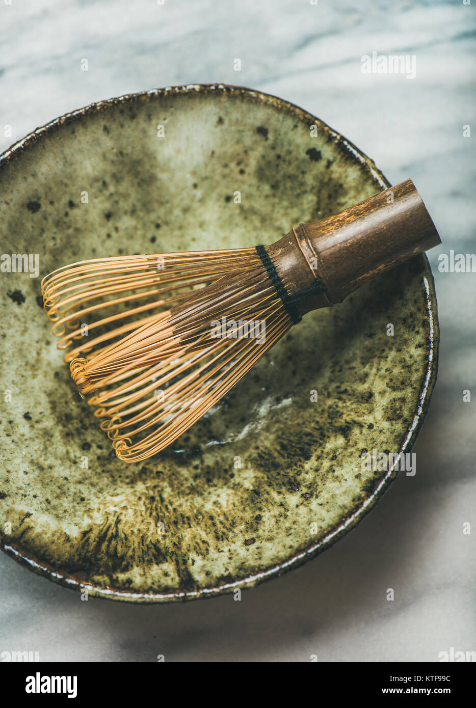 Chasen bamboo whisk, Chawan bowl over grey background, top view Stock ...